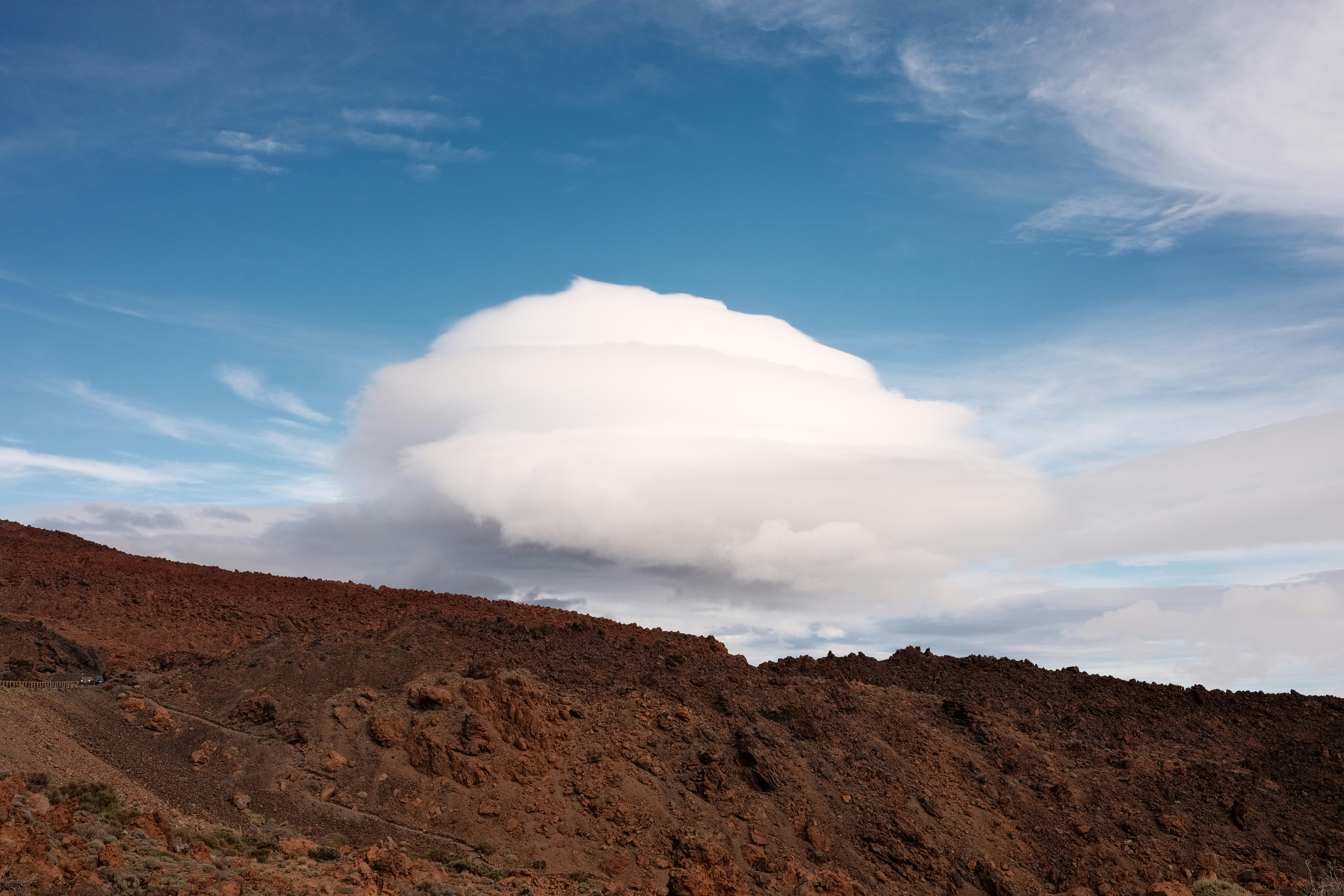 Red Desert Ridge Meets a Quiet Cloud Dome