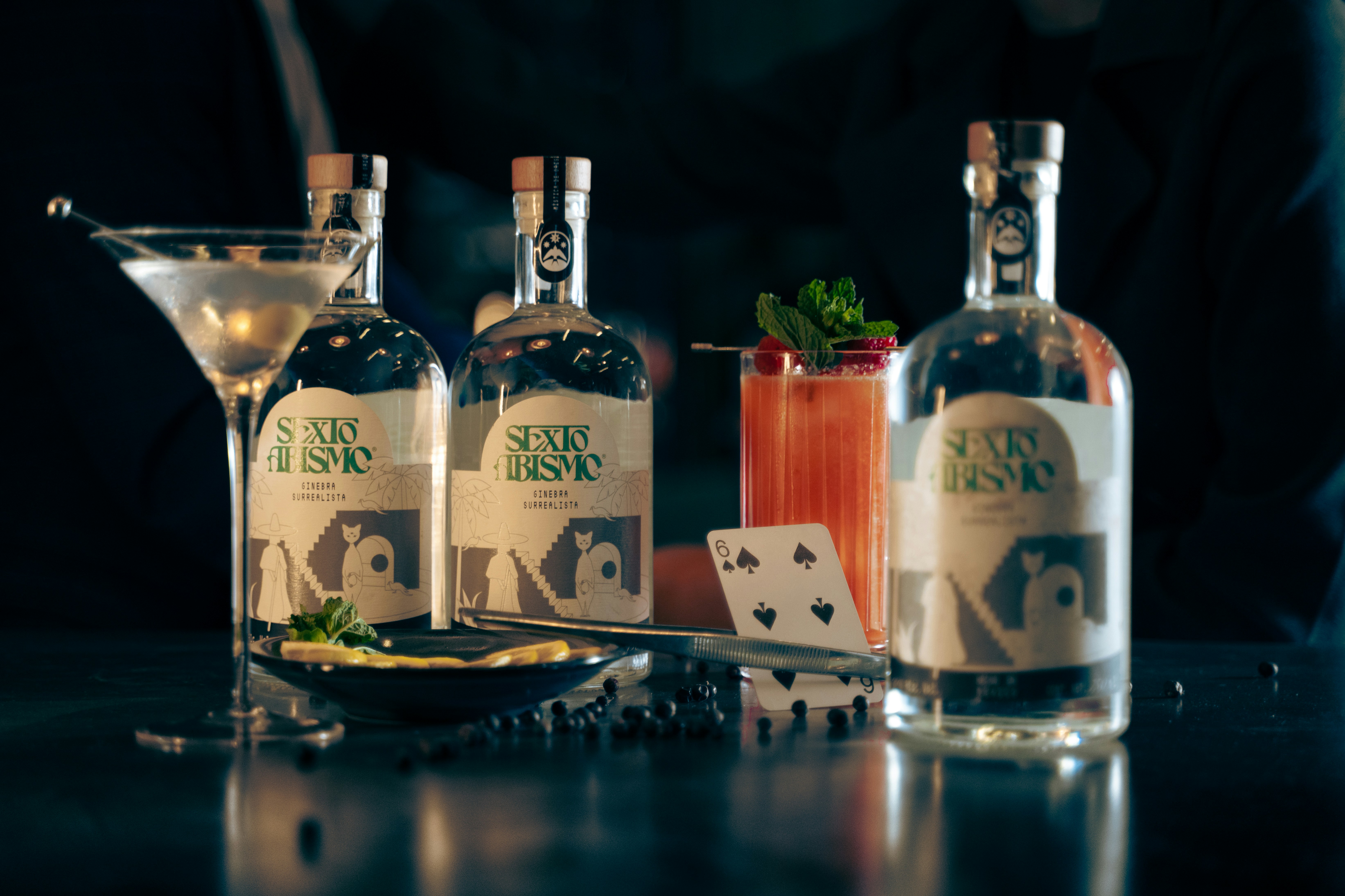 A table topped with three bottles of alcohol photo – Free Cocktail ...