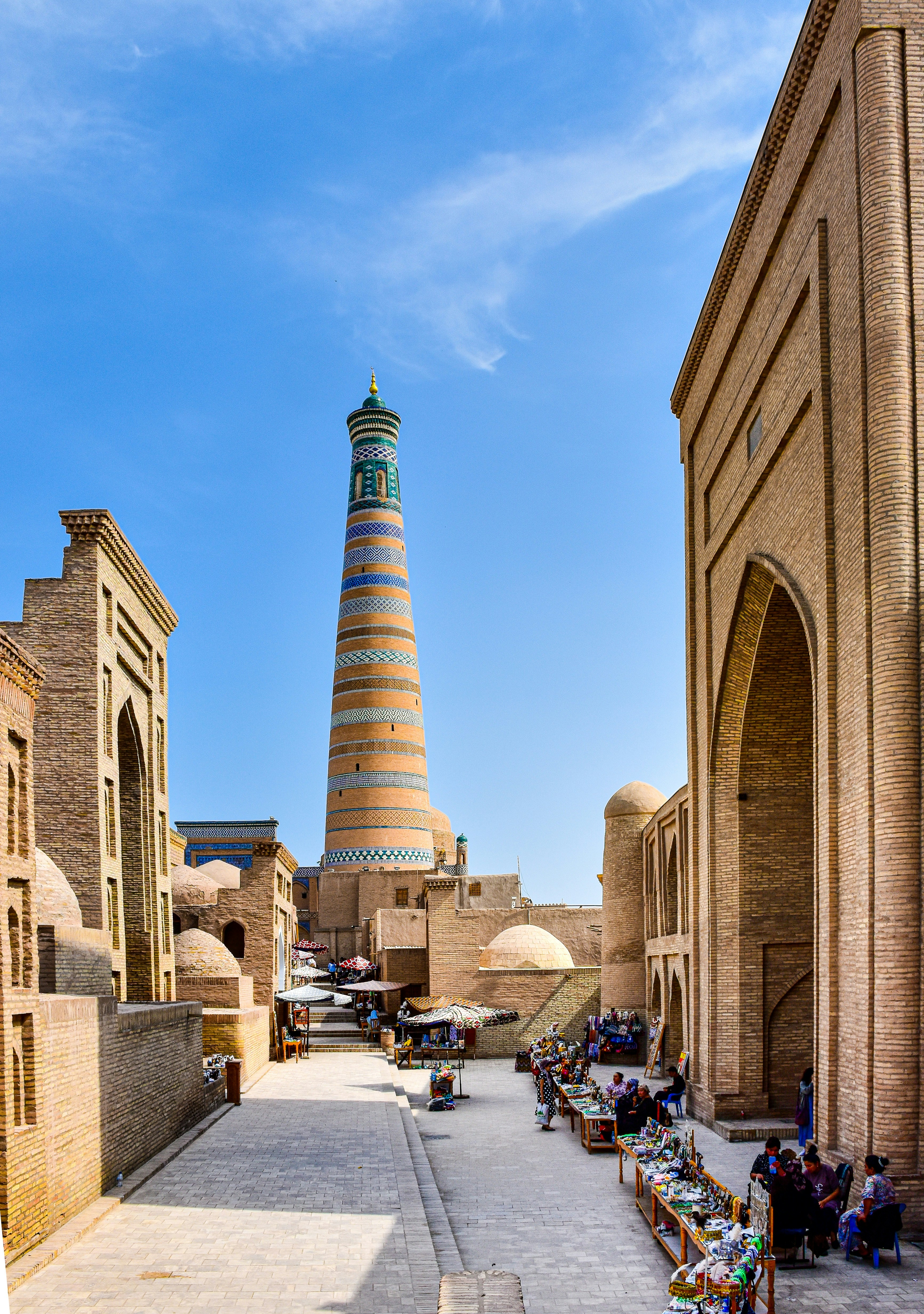 A very tall tower towering over a city photo – Free Travel Image on ...