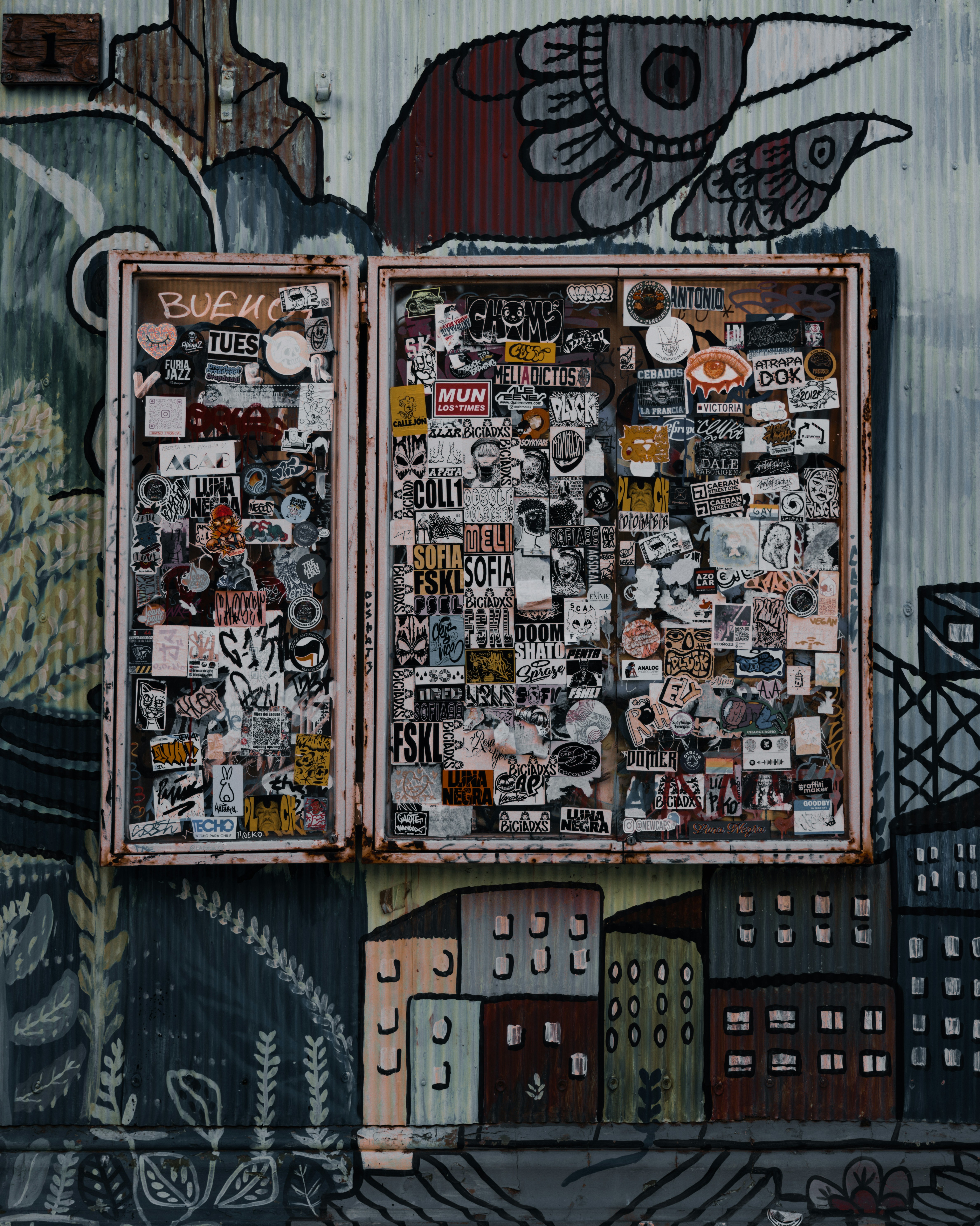 A picture of a city with lots of stickers on it photo – Free Building ...