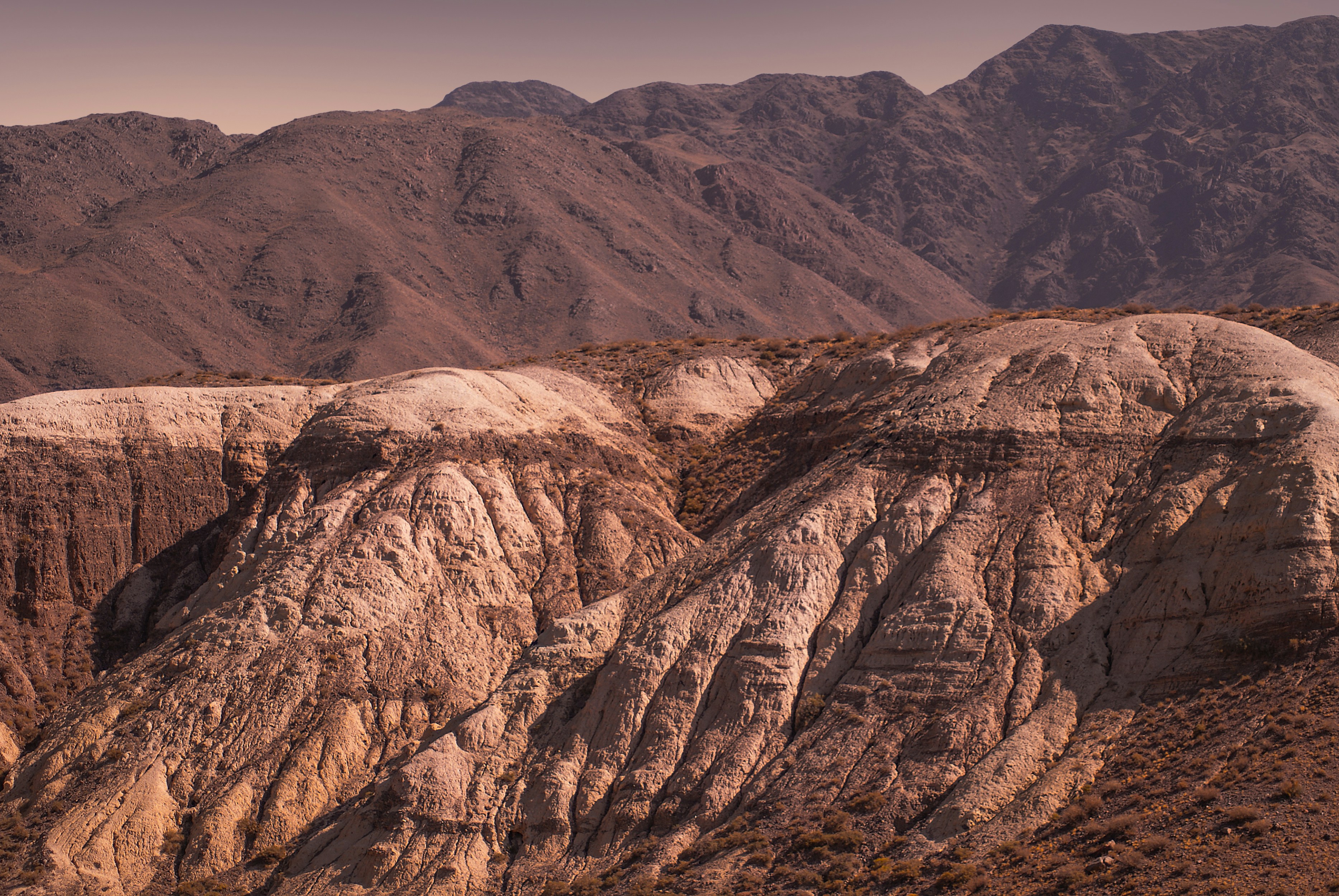 A view of a mountain range in the desert photo – Free Boom gorge Image ...