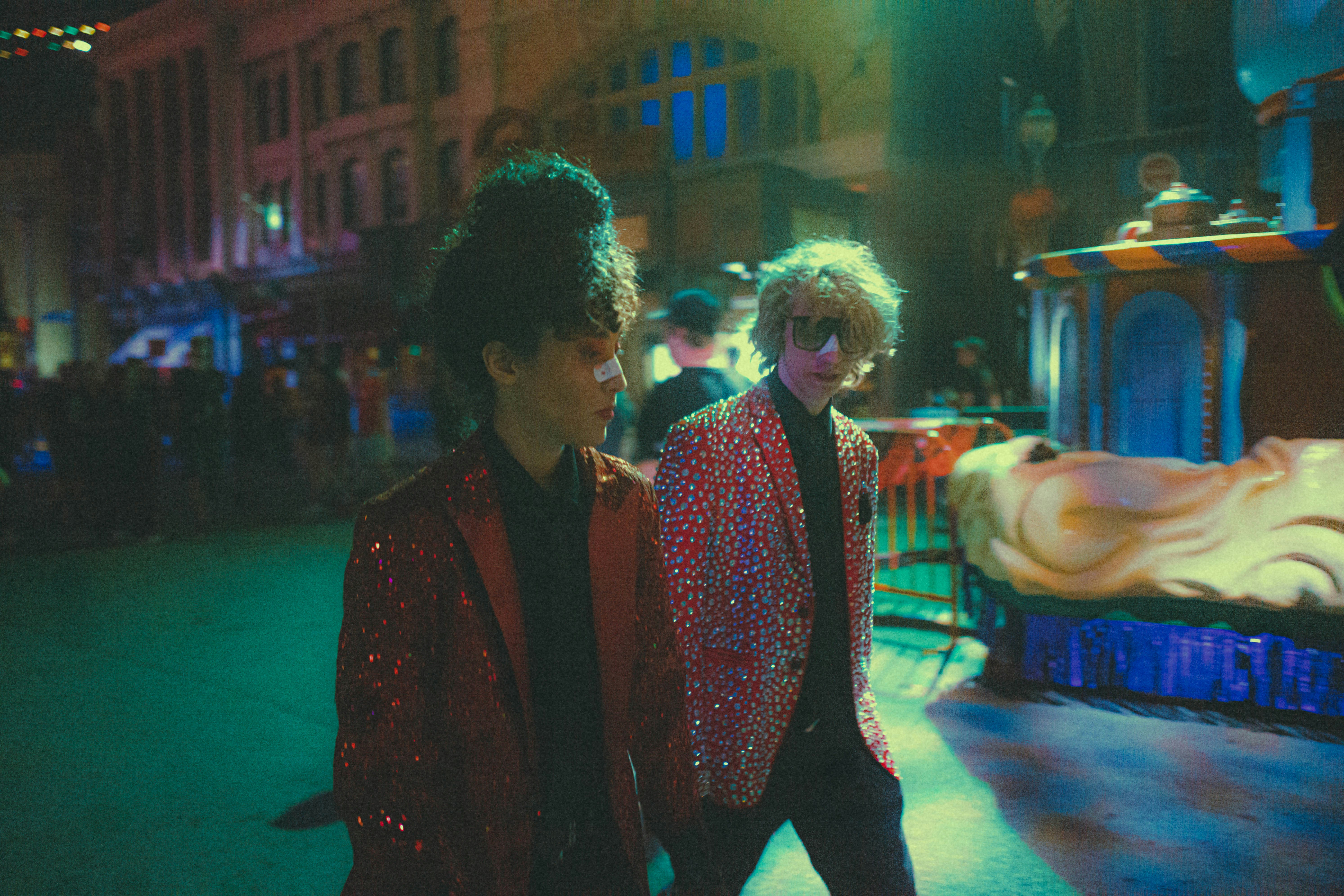 Neon Night Walk: Glittering Jackets and City Lights
