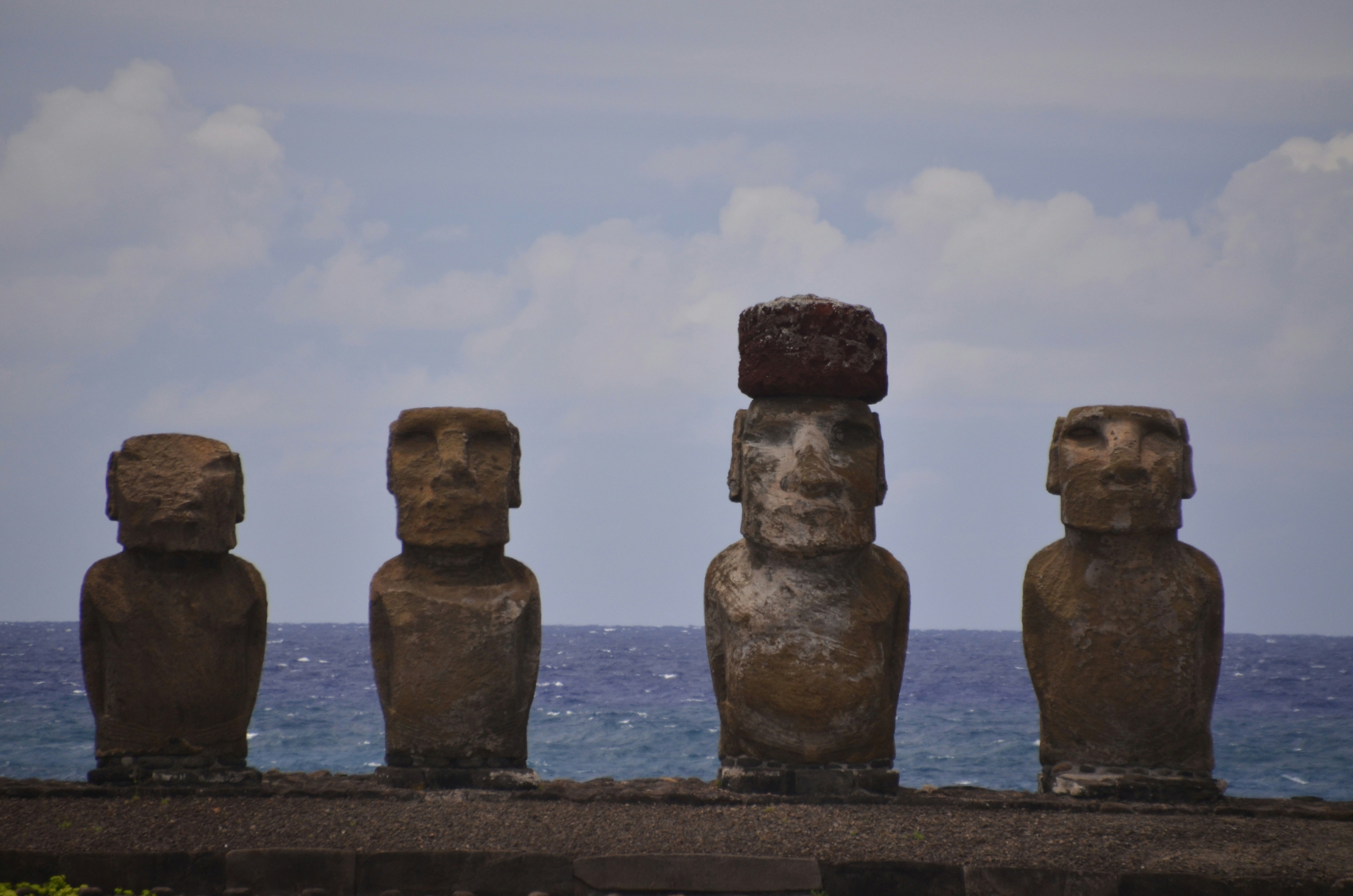 Tidebound Figures: Four Stone Moai-like Faces Guard the Sea