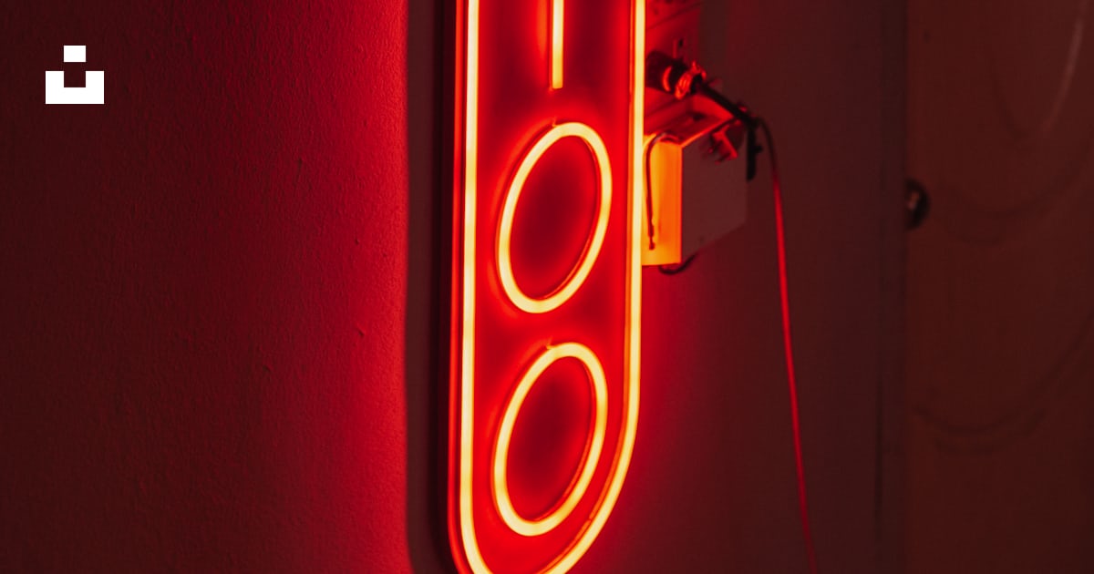 A Red Neon Sign That Says Tattoo On It Photo Free Light Image On Unsplash