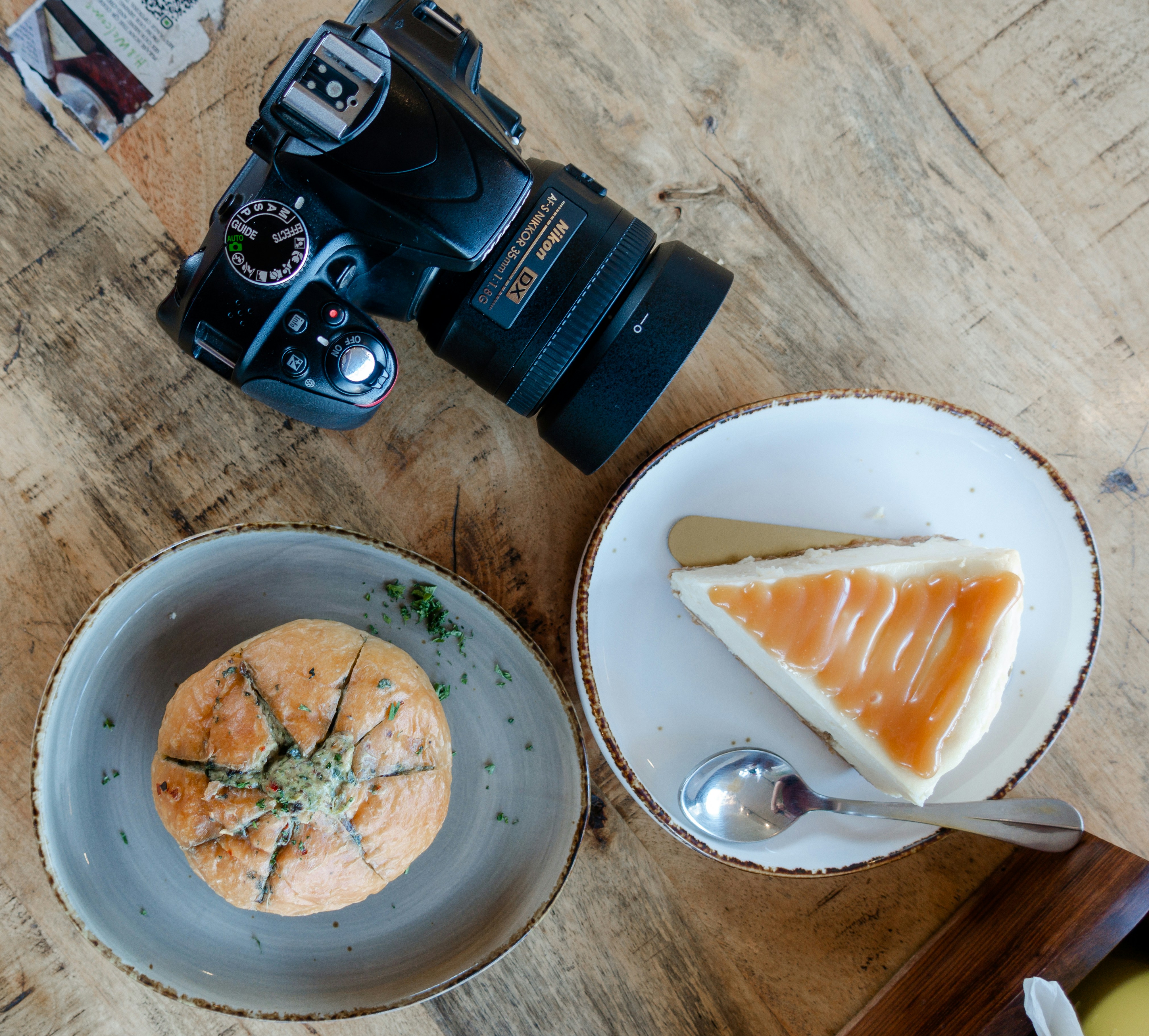 Overhead Studio Snack: Sony RX100 III Among Pastry and Cheesecake on Weathered Wood