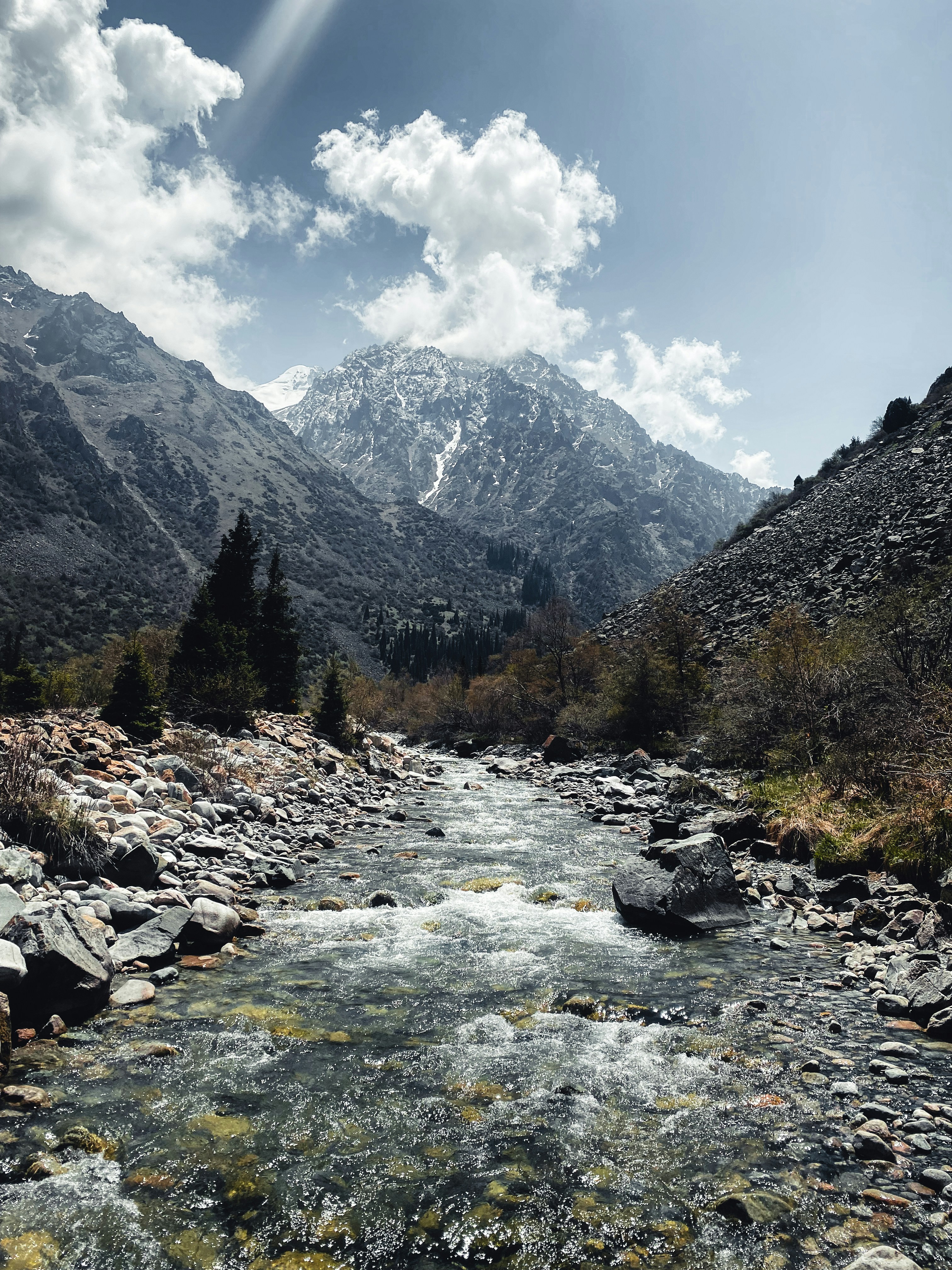 A stream running through a rocky mountain valley photo – Free Ala archa ...