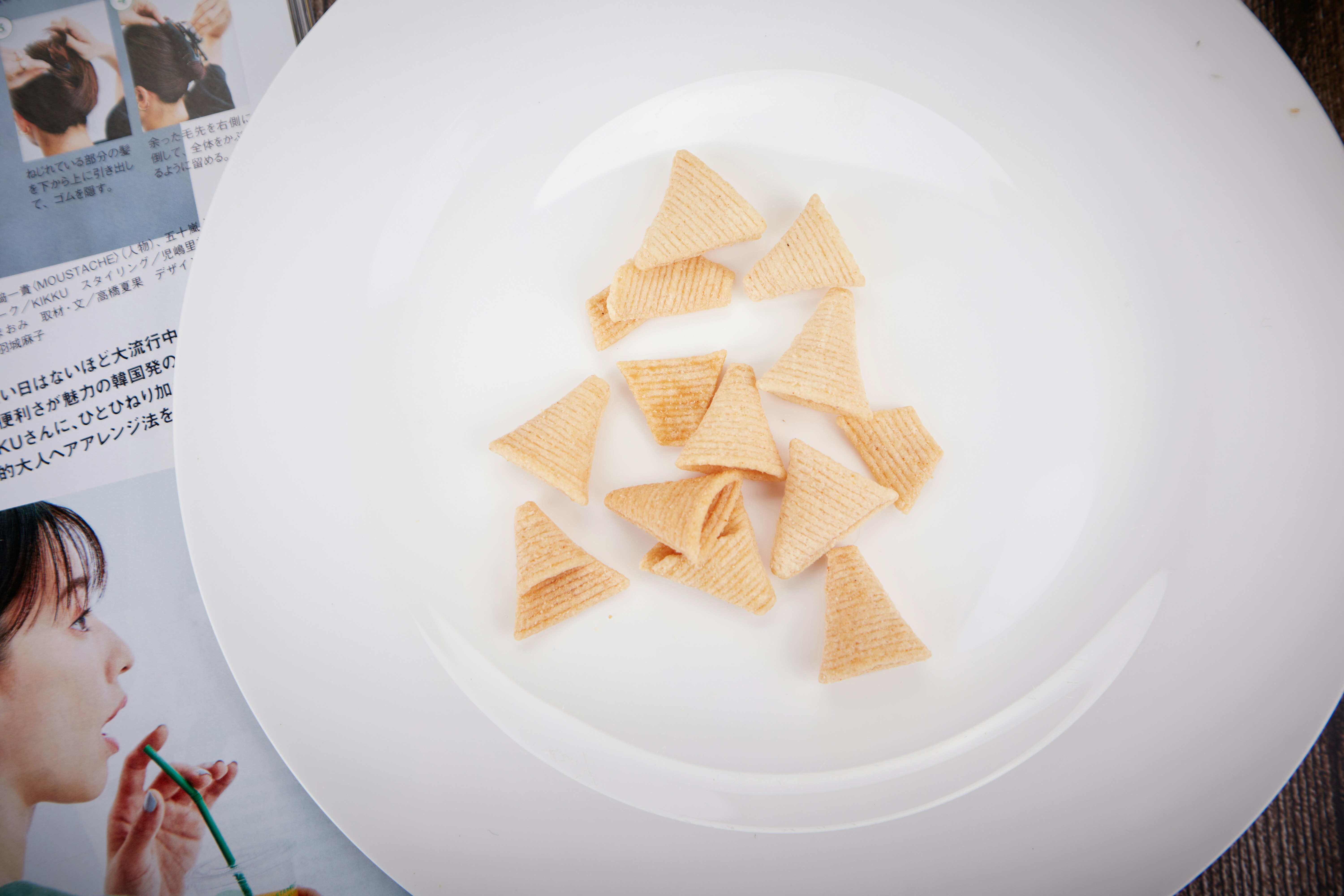A white plate topped with cheetos on top of a table photo – Free Food ...