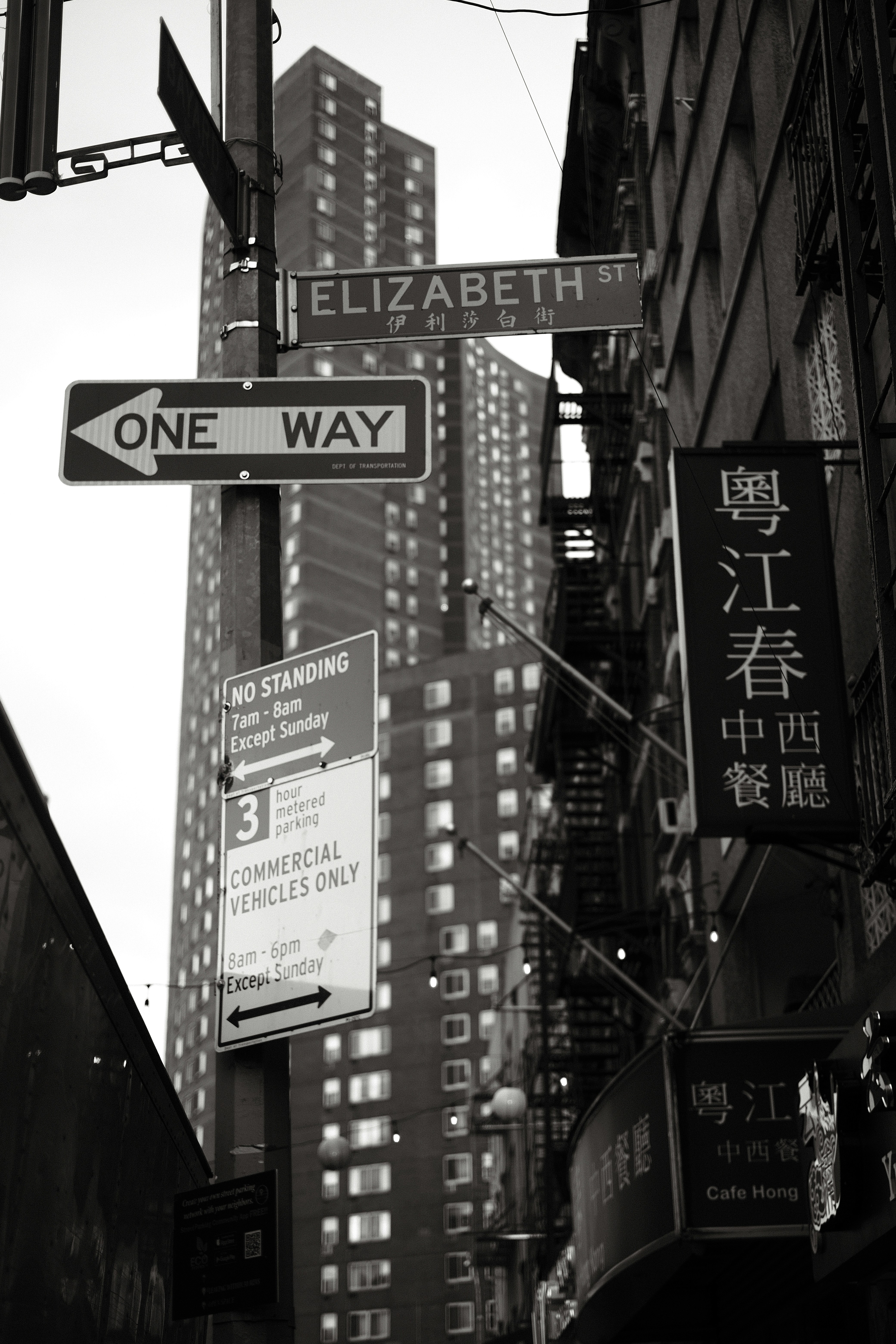 A one way sign and street signs in a city photo – Free Sign Image on ...
