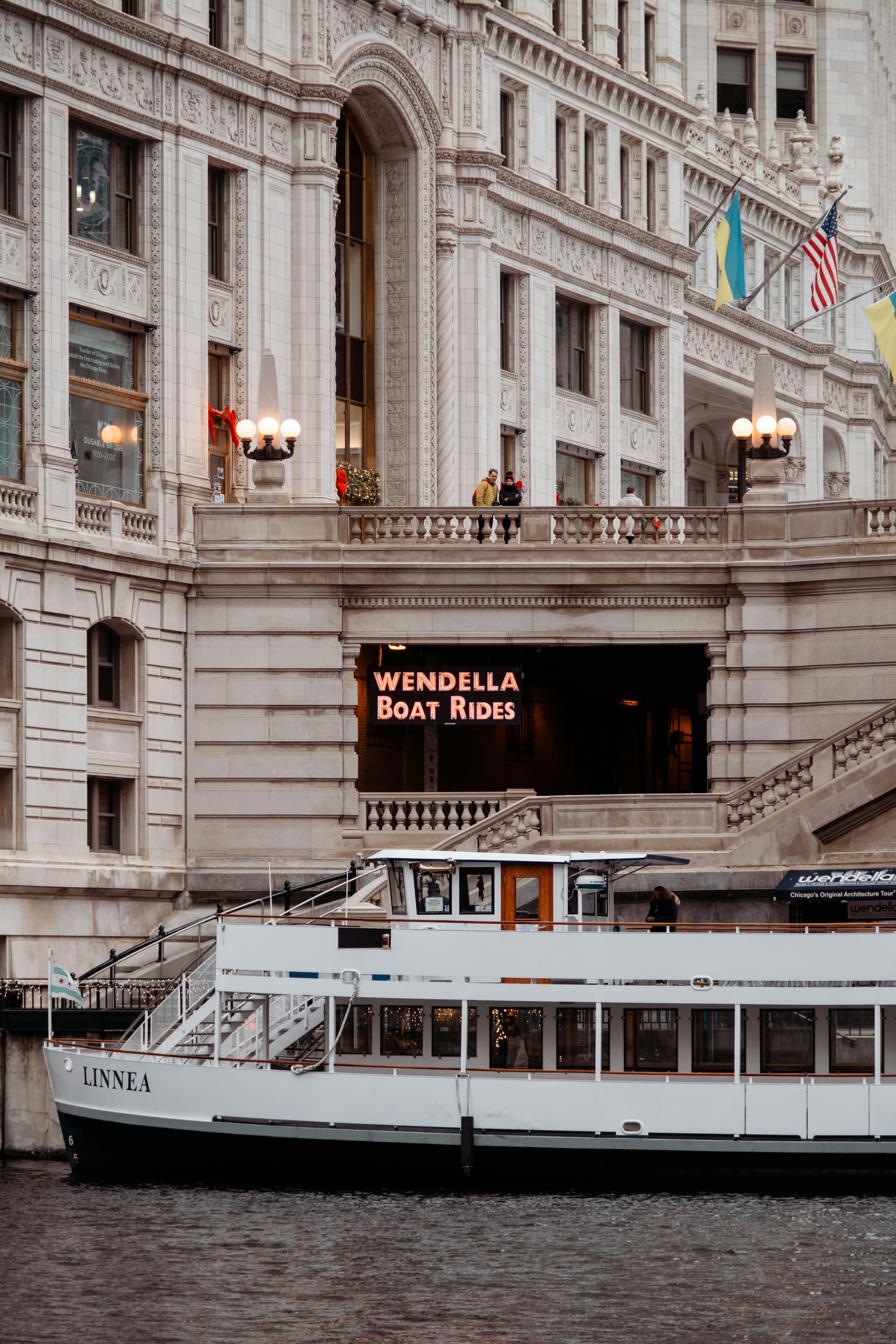 Marble Facade and Docked Steamer: The Wendella Riverfront Scene