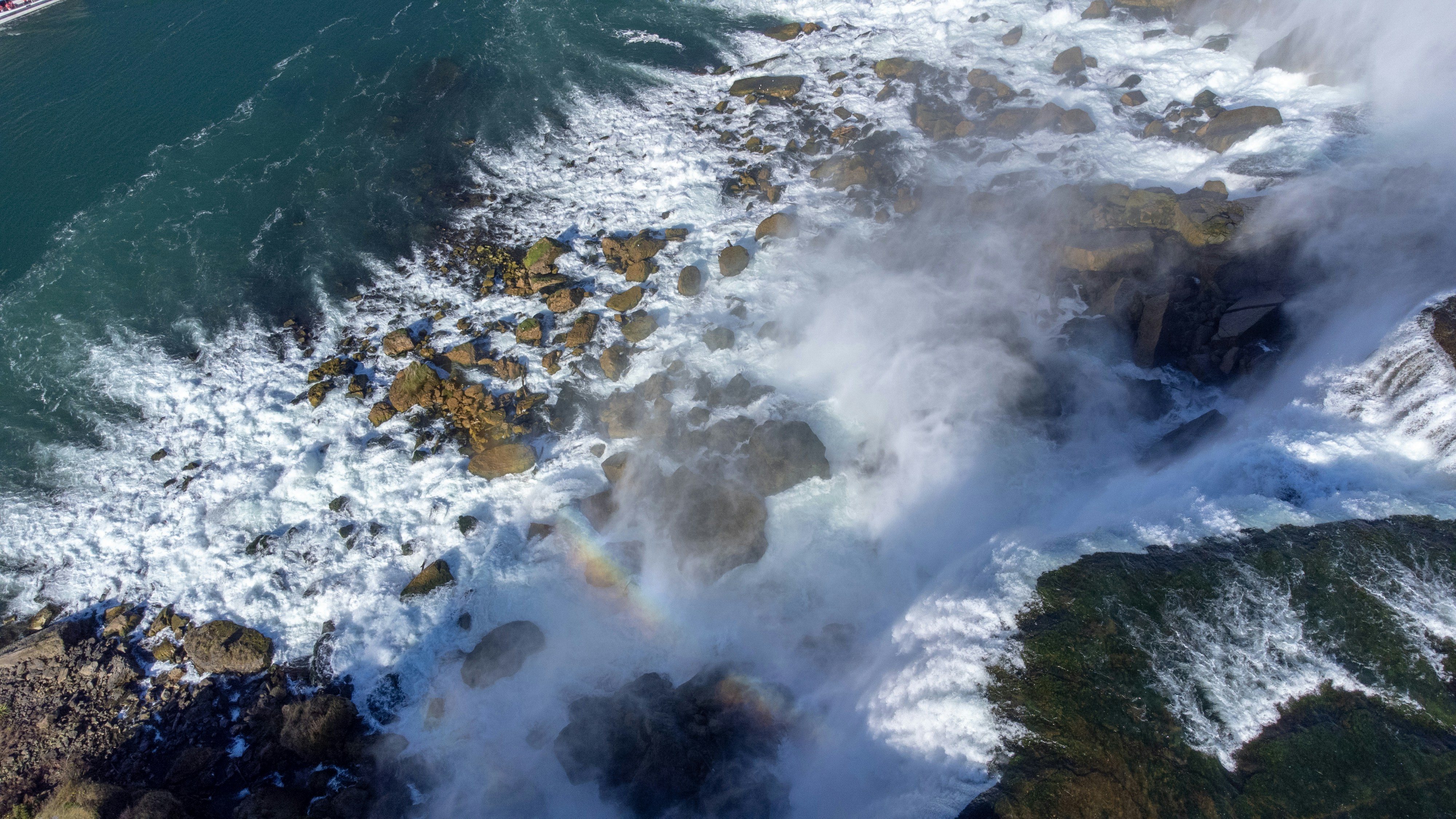 An aerial view of a waterfall in the ocean photo – Free Sea Image on ...