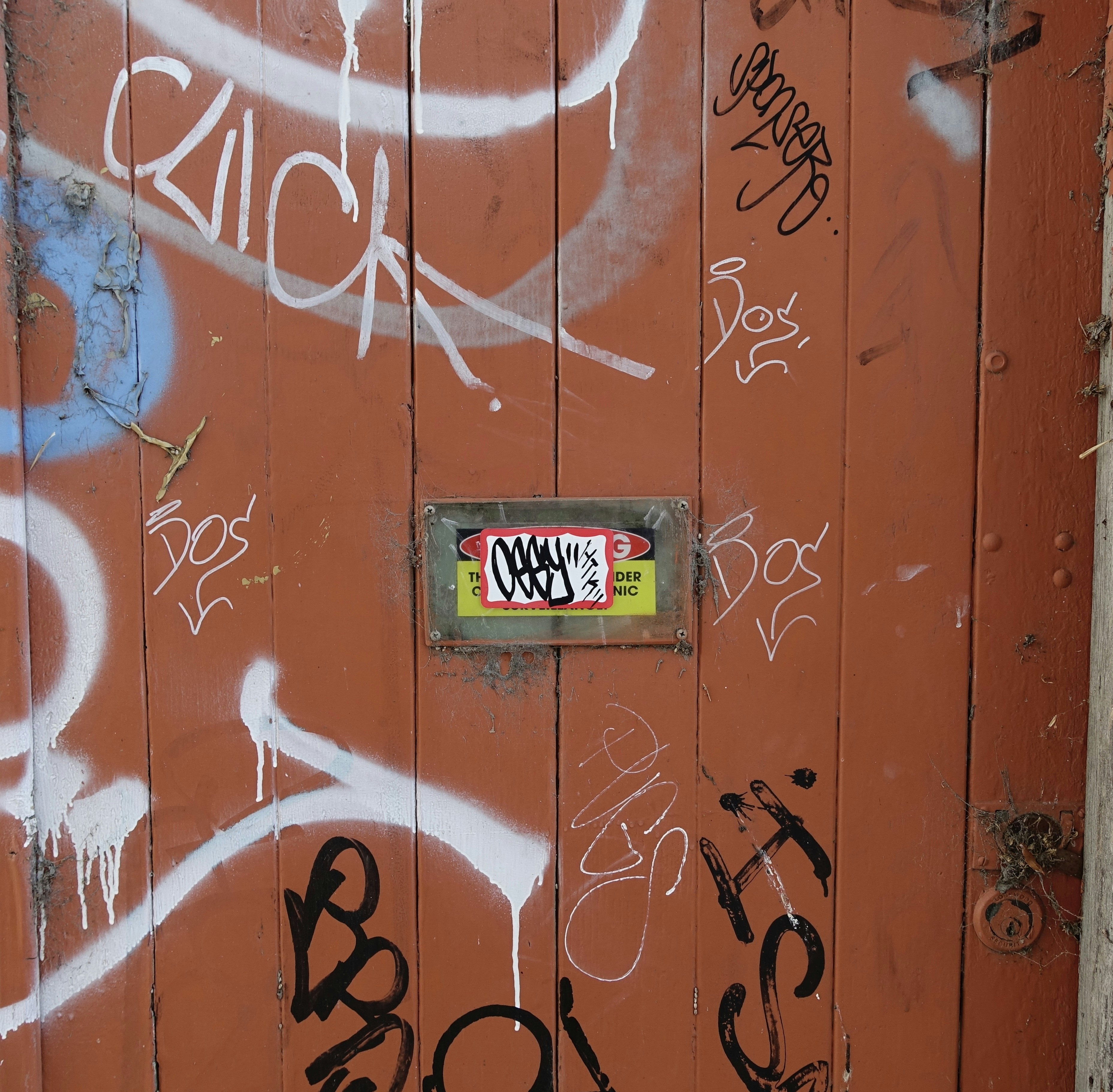 A door with a bunch of graffiti on it photo – Free Text Image on Unsplash