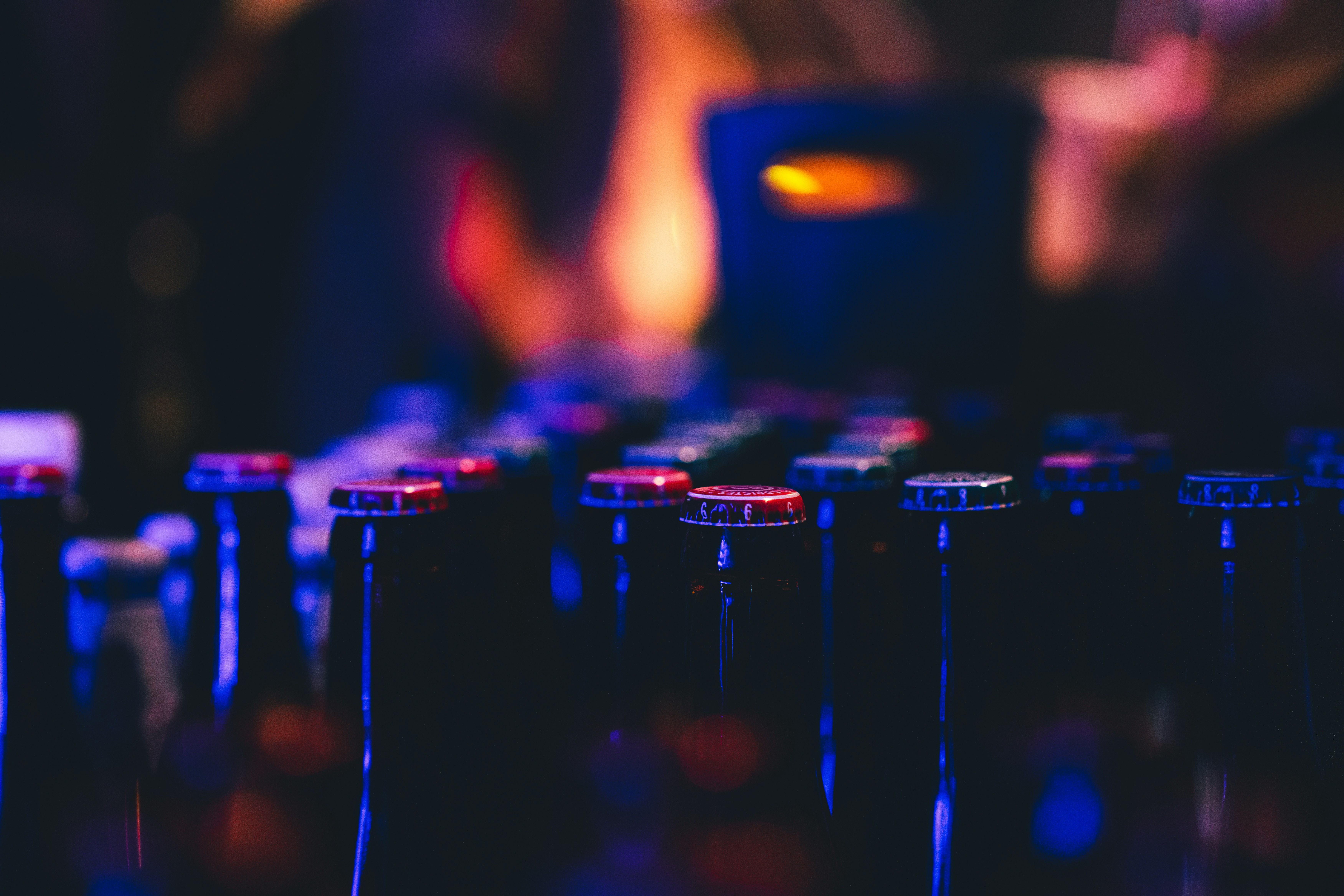 A close up of a bunch of beer bottles photo – Free Neon Image on Unsplash