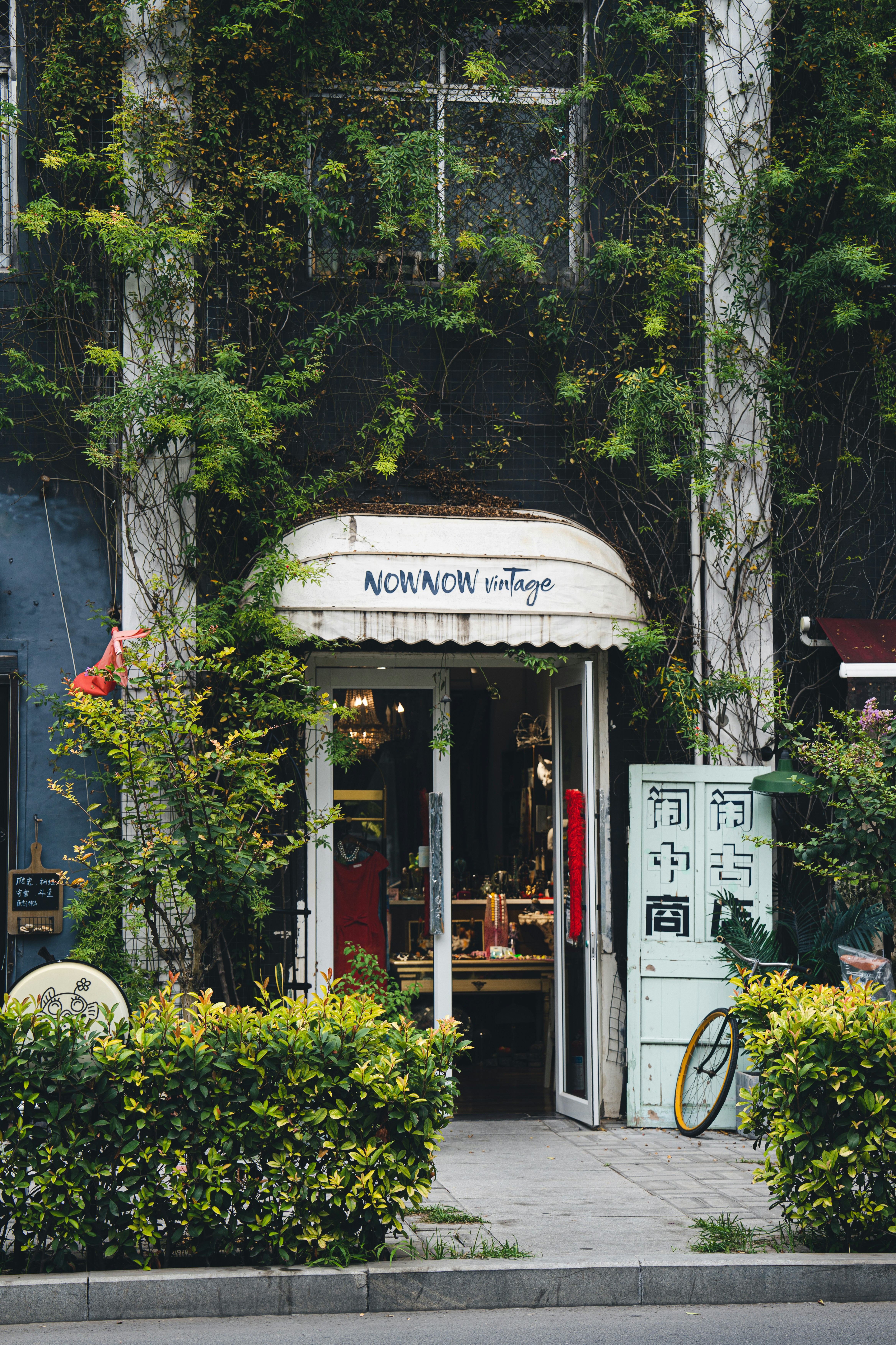Ivy-Framed NOWNOW vintage storefront invites a closer look.