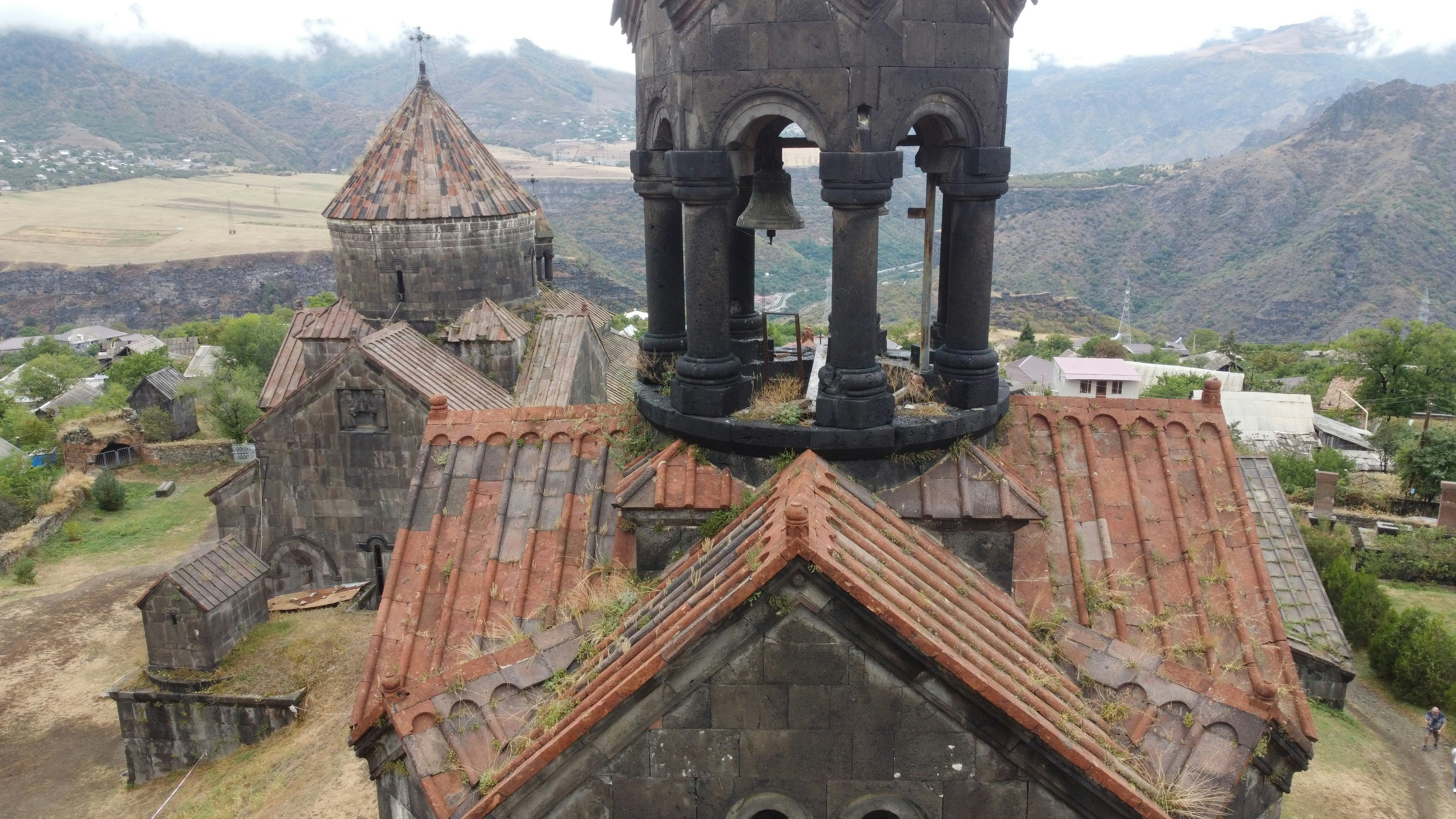 An aerial view of a building with a clock tower photo – Free Monastery ...