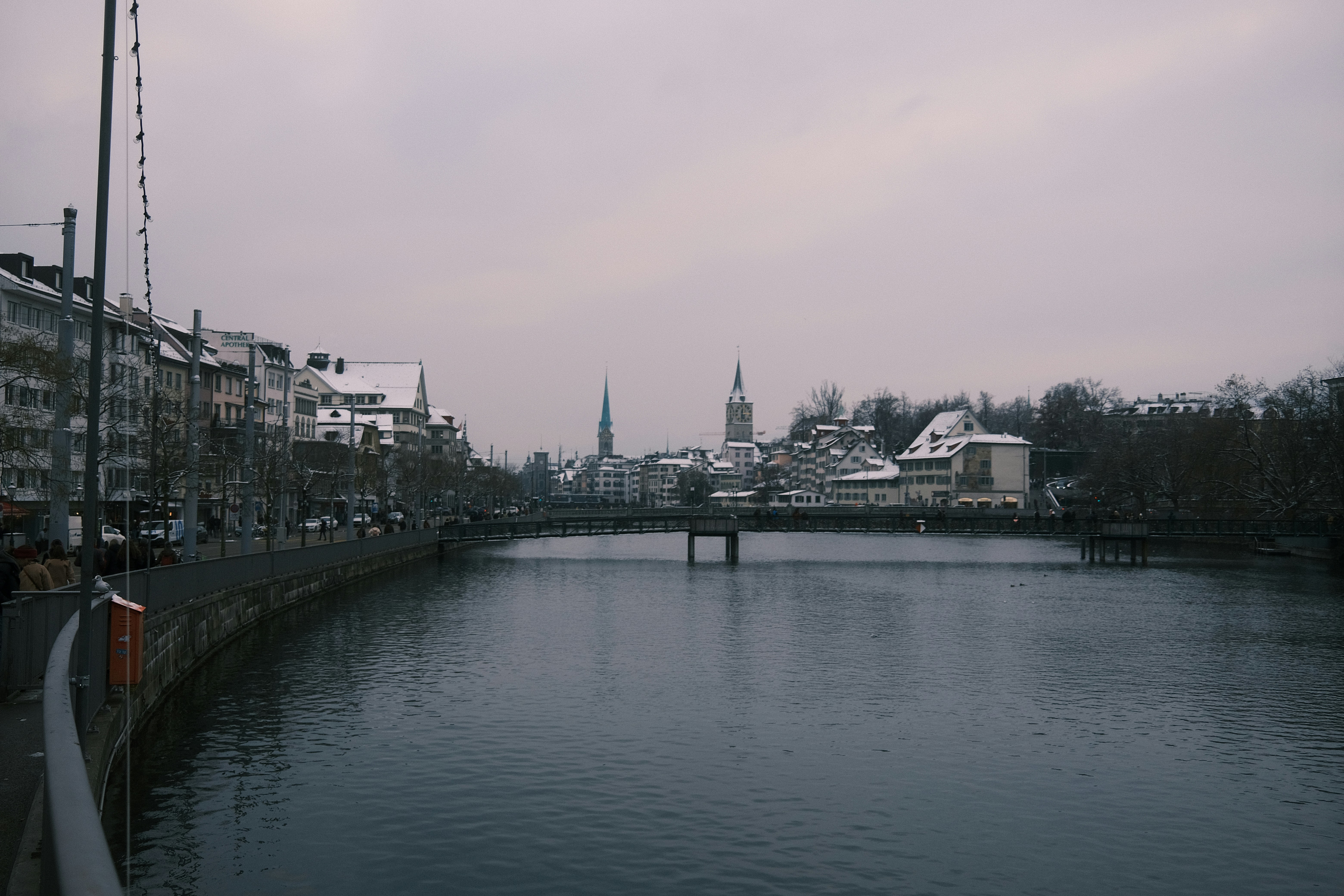 Distant Spire over a Quiet Winter River