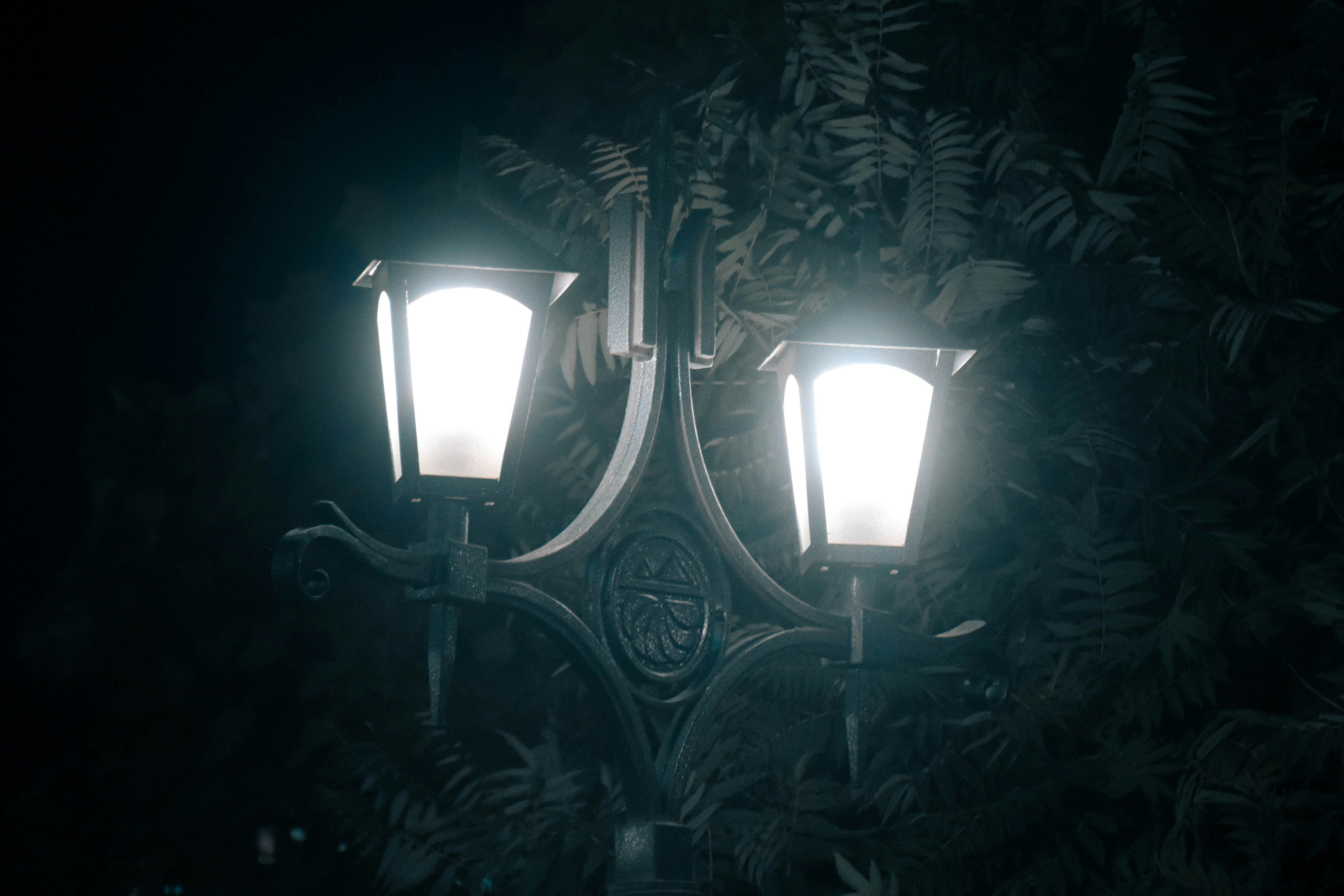 a couple of lights that are on a pole