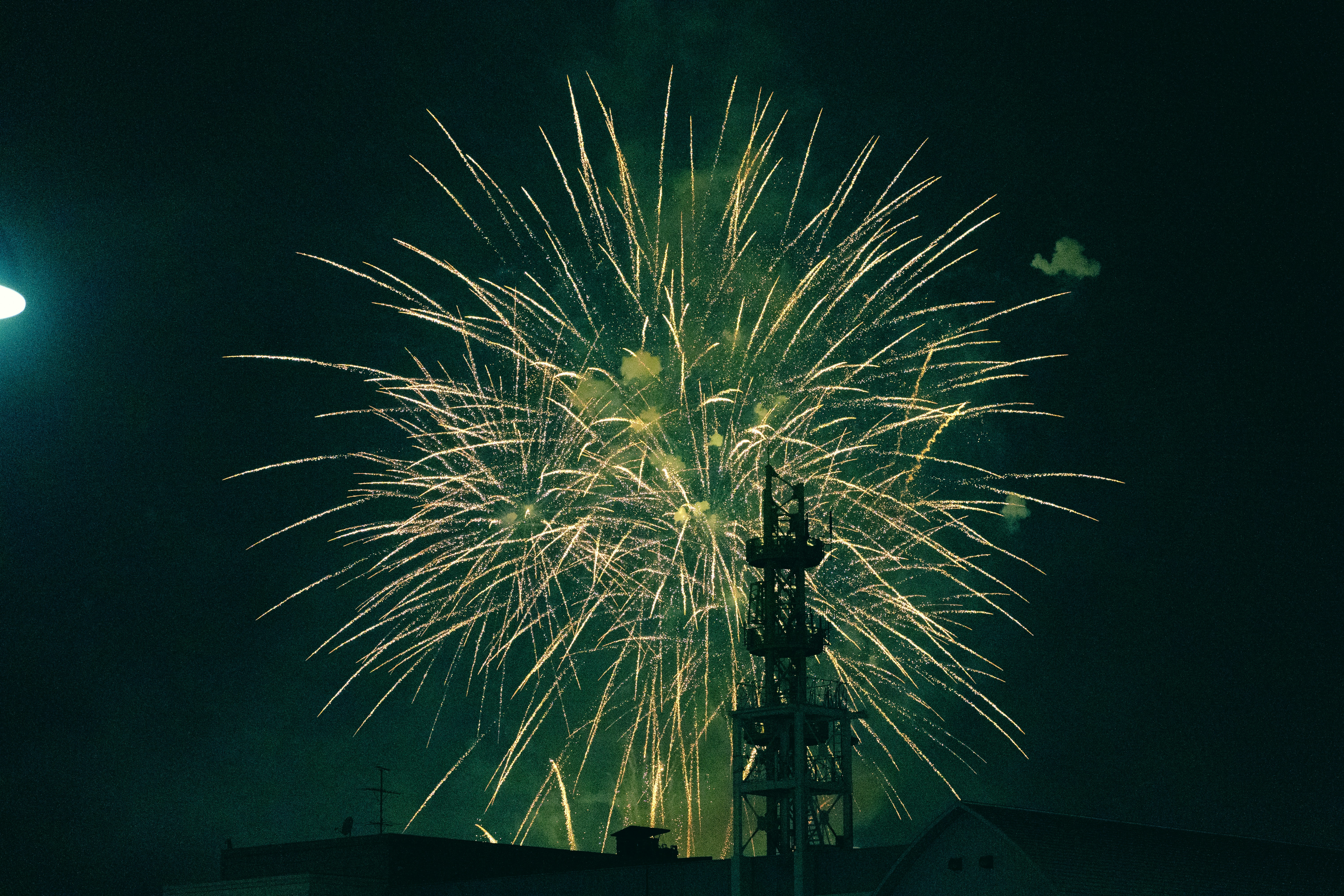 A large fireworks is lit up in the night sky photo – Free 1 1 shinko ...
