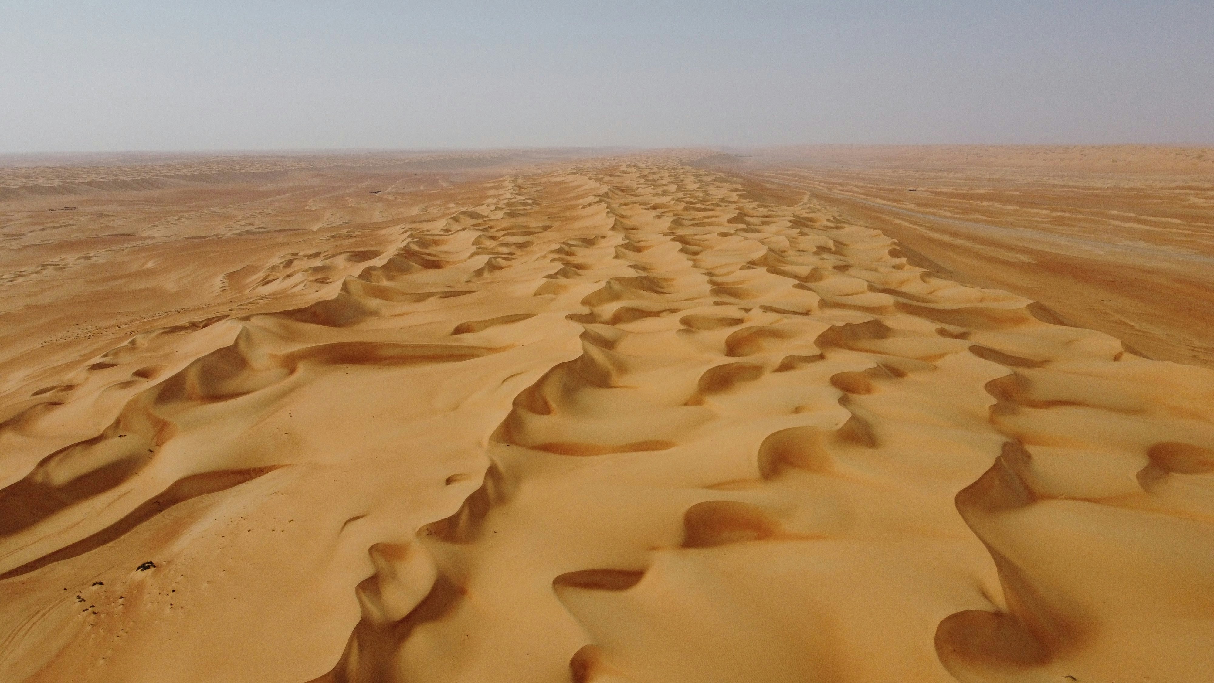 A large sandy area in the middle of the desert photo – Free Desert ...