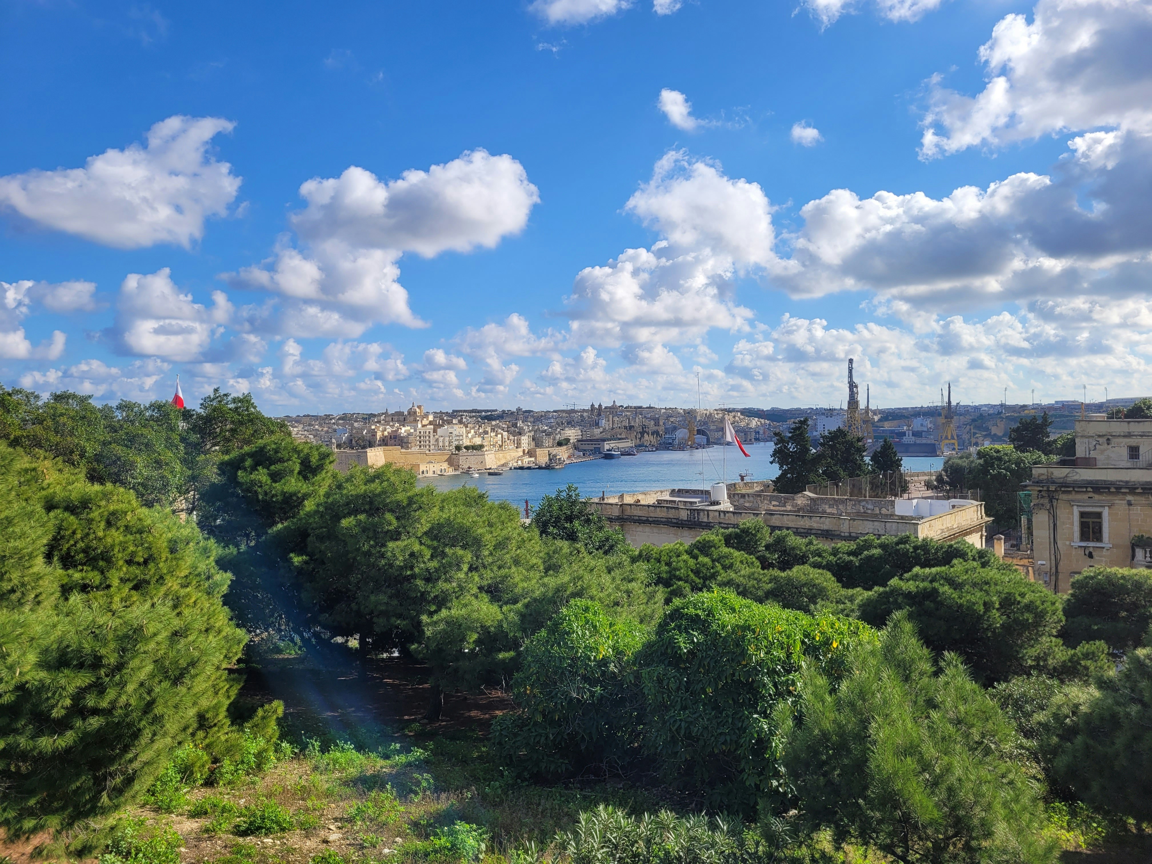 A view of a river and a city from a hill photo – Free Malta Image on ...