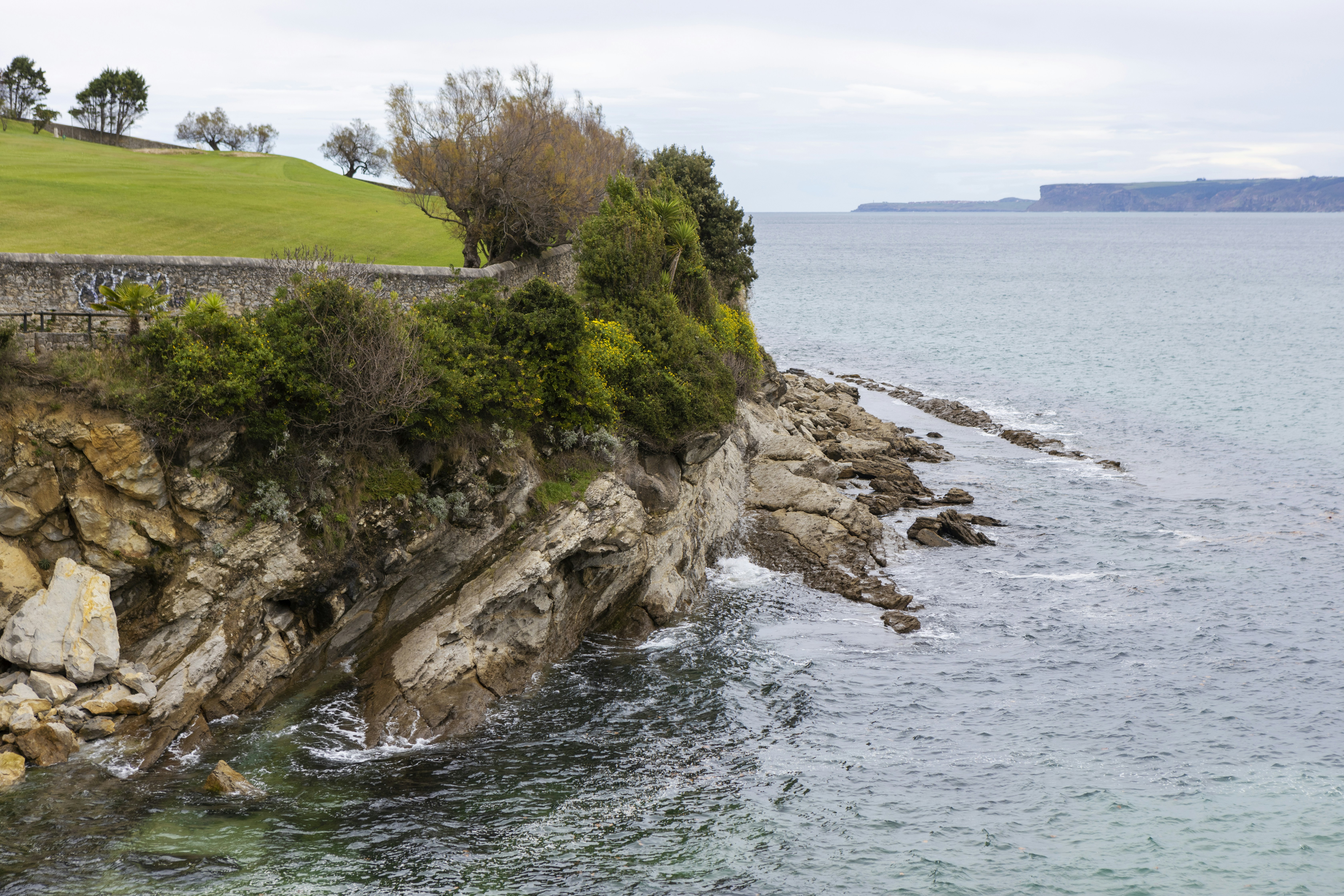 Cliffside Greens Meet the Quiet Sea