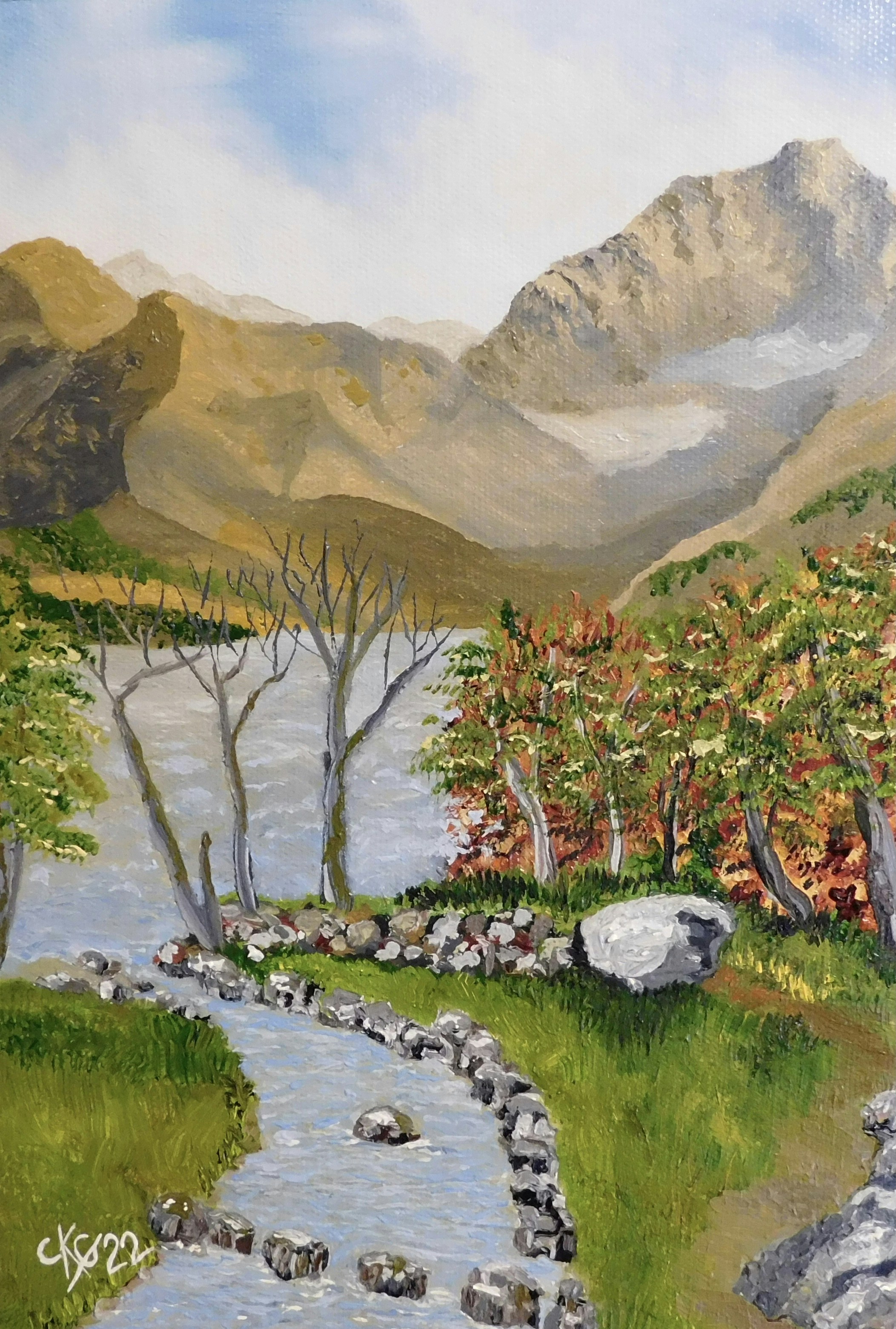 A tranquil landscape painting featuring a winding river bordered by vibrant trees and rocky formations, set against majestic mountains under a soft sky.