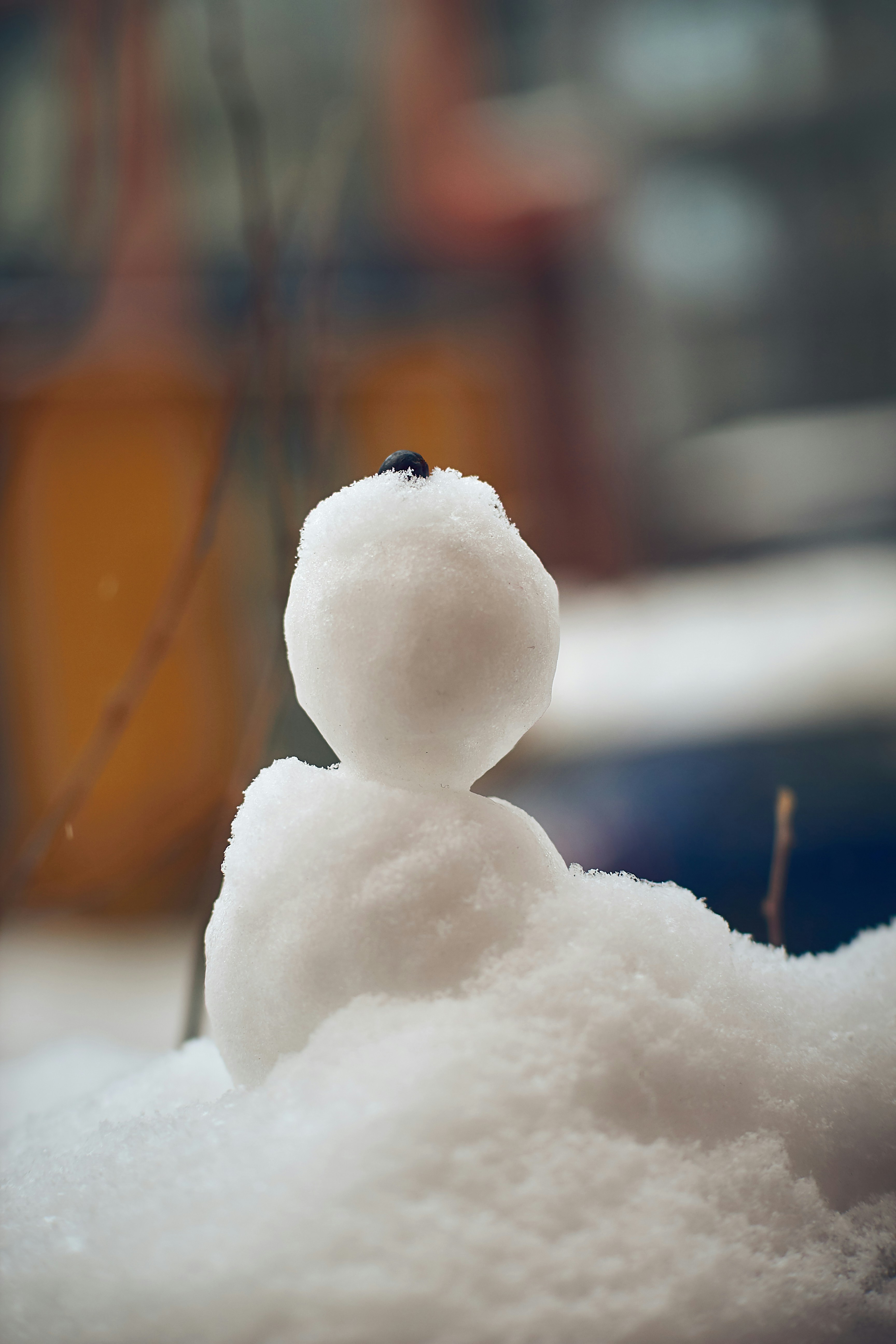 A snowman is standing in the snow photo – Free Image on Unsplash