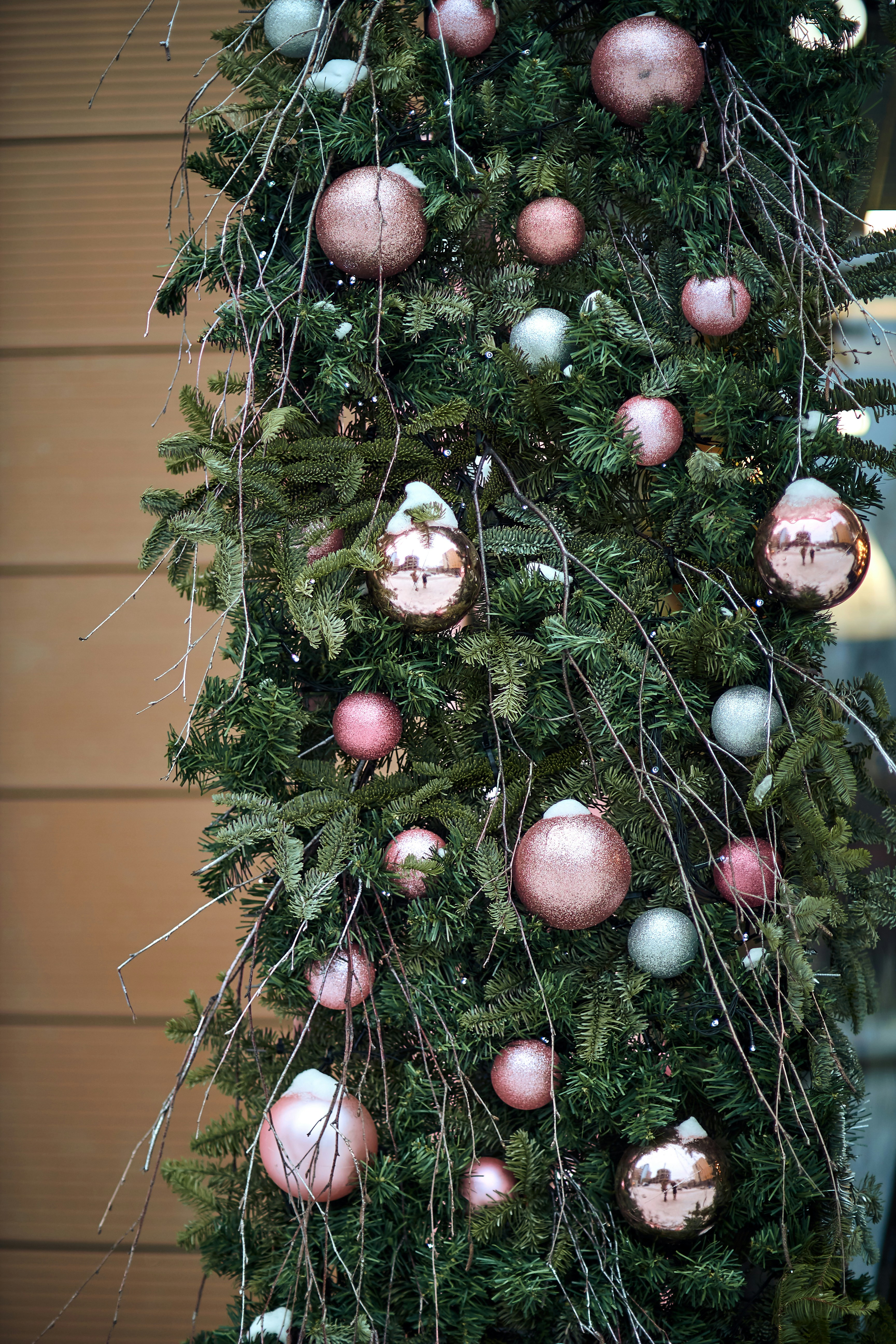 a christmas tree with ornaments hanging from it