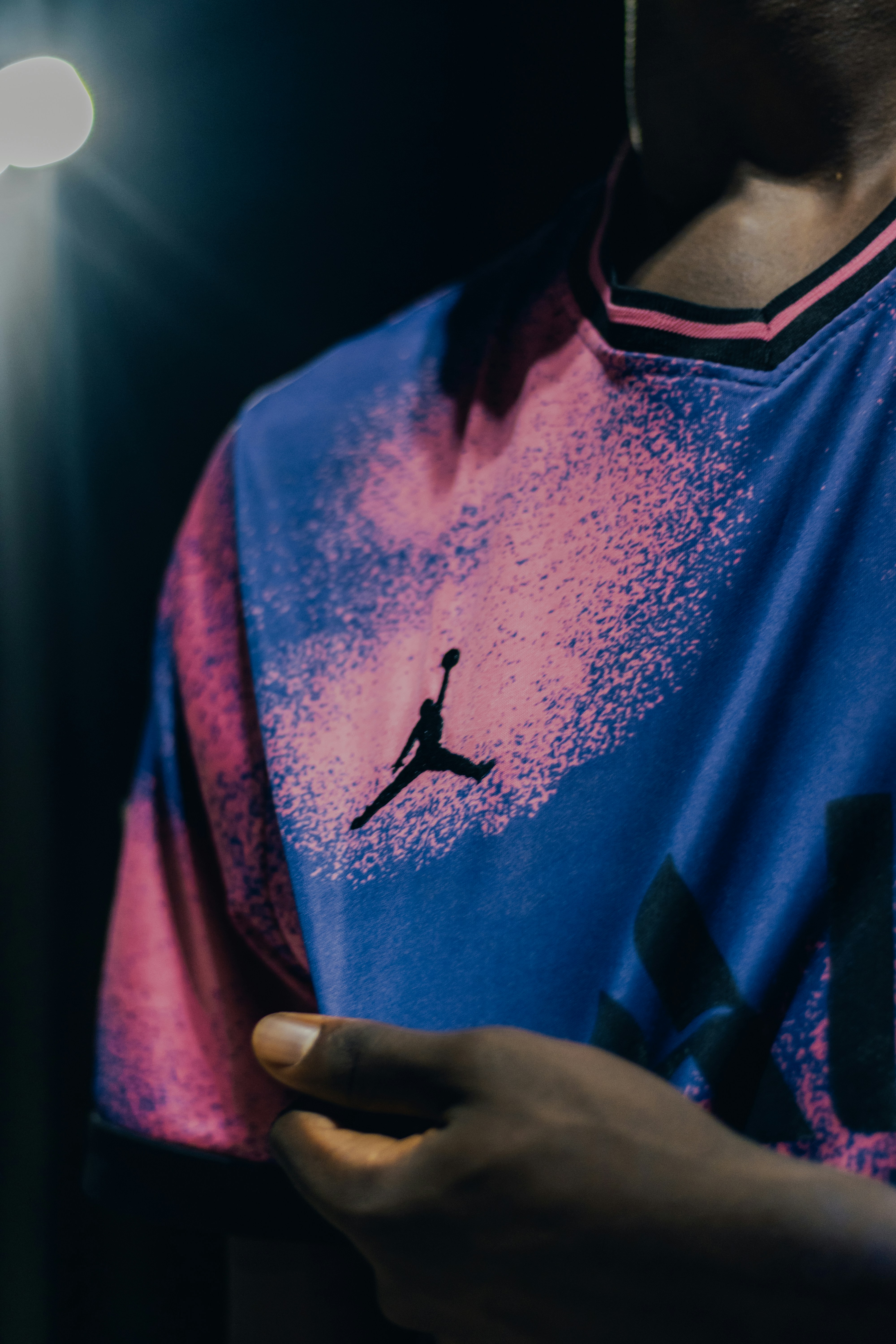 Dialed-In Neon: The Jumpman on a Stormy Jersey