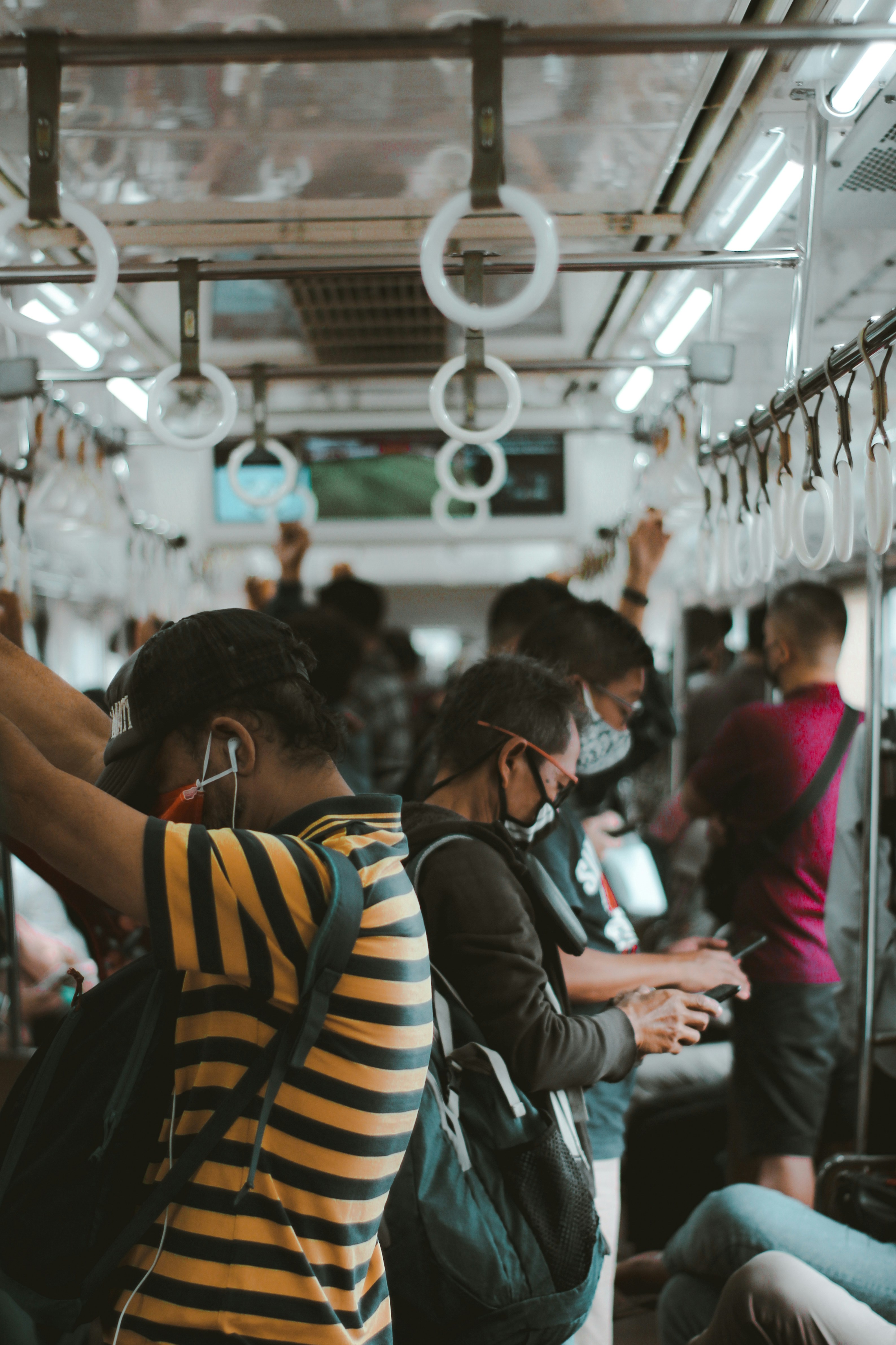 A group of people riding on a bus photo – Free Male Image on Unsplash