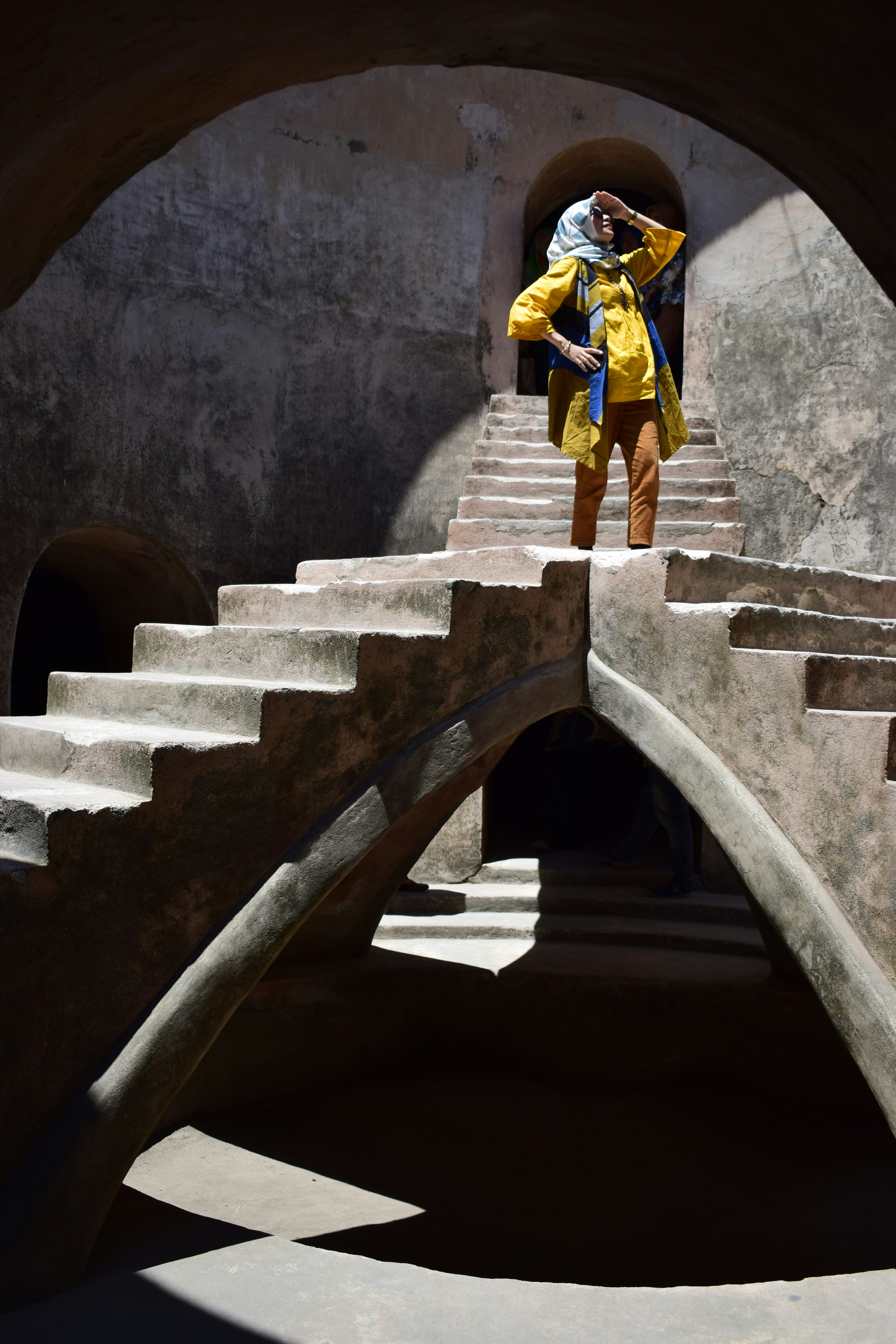 Bright Traveler at the Archway Staircase