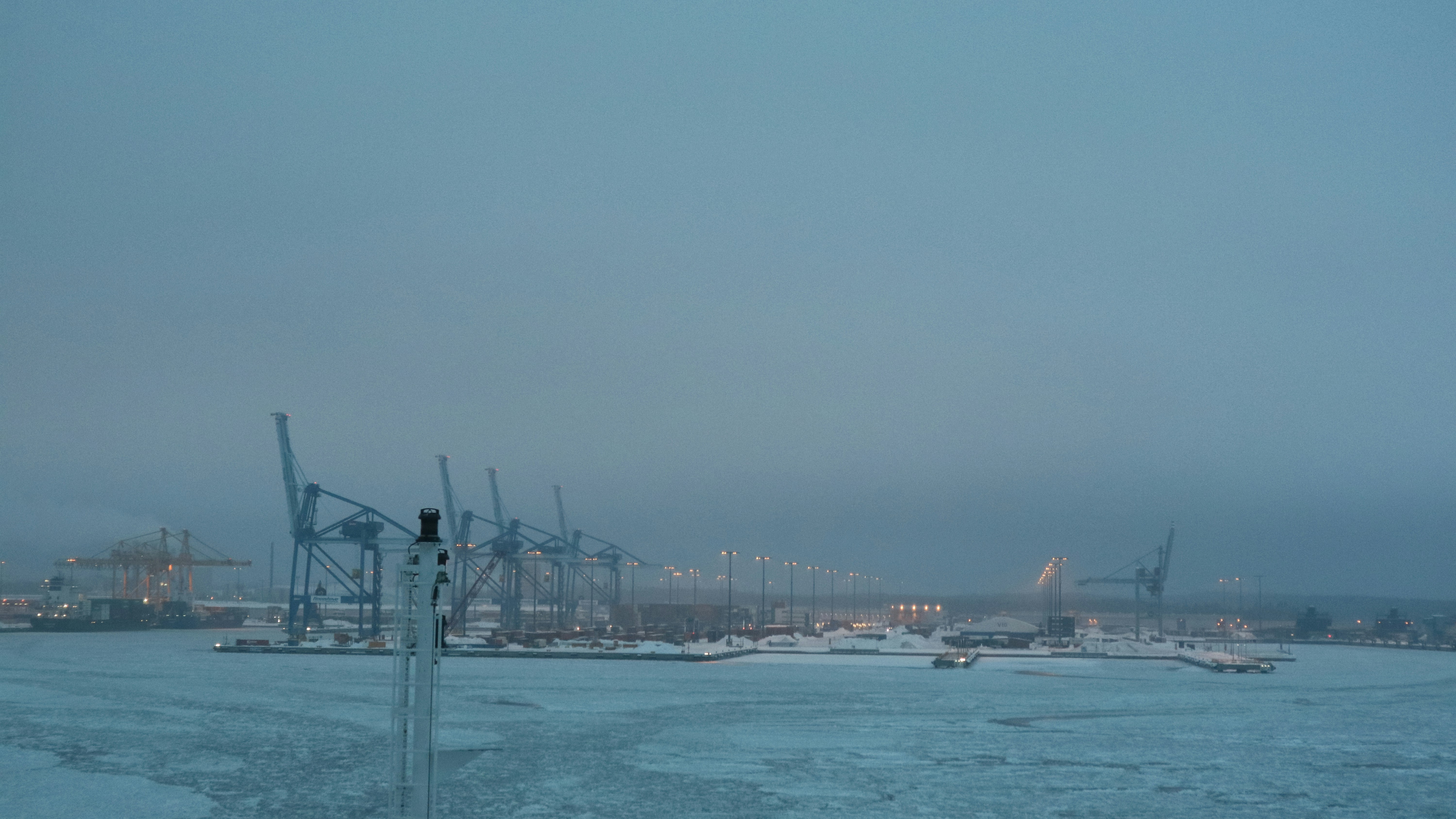 Frozen Harbor: A Winter's Industrial Embrace