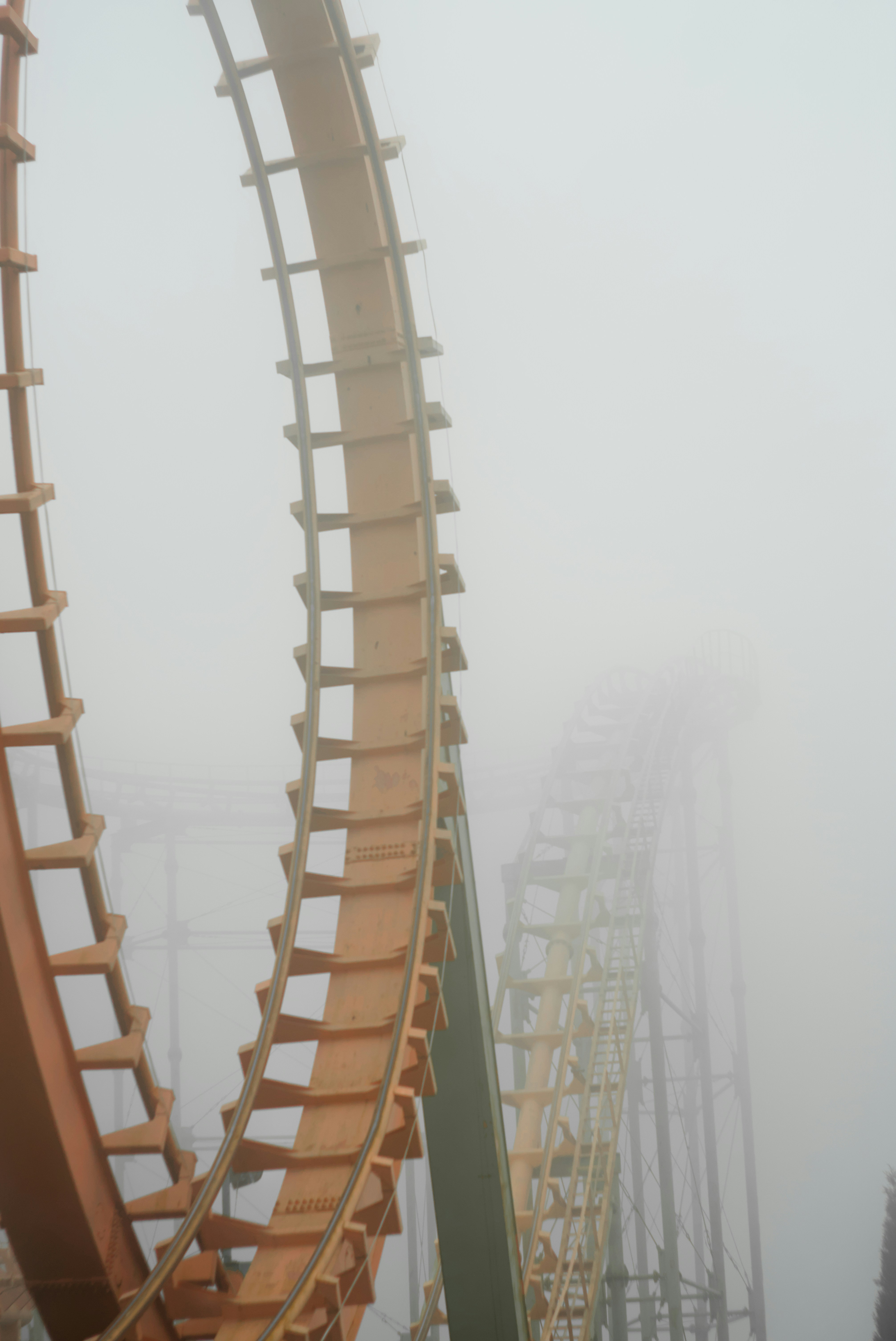 Coil of Steel in the Mist: A Fogbound Roller Coaster
