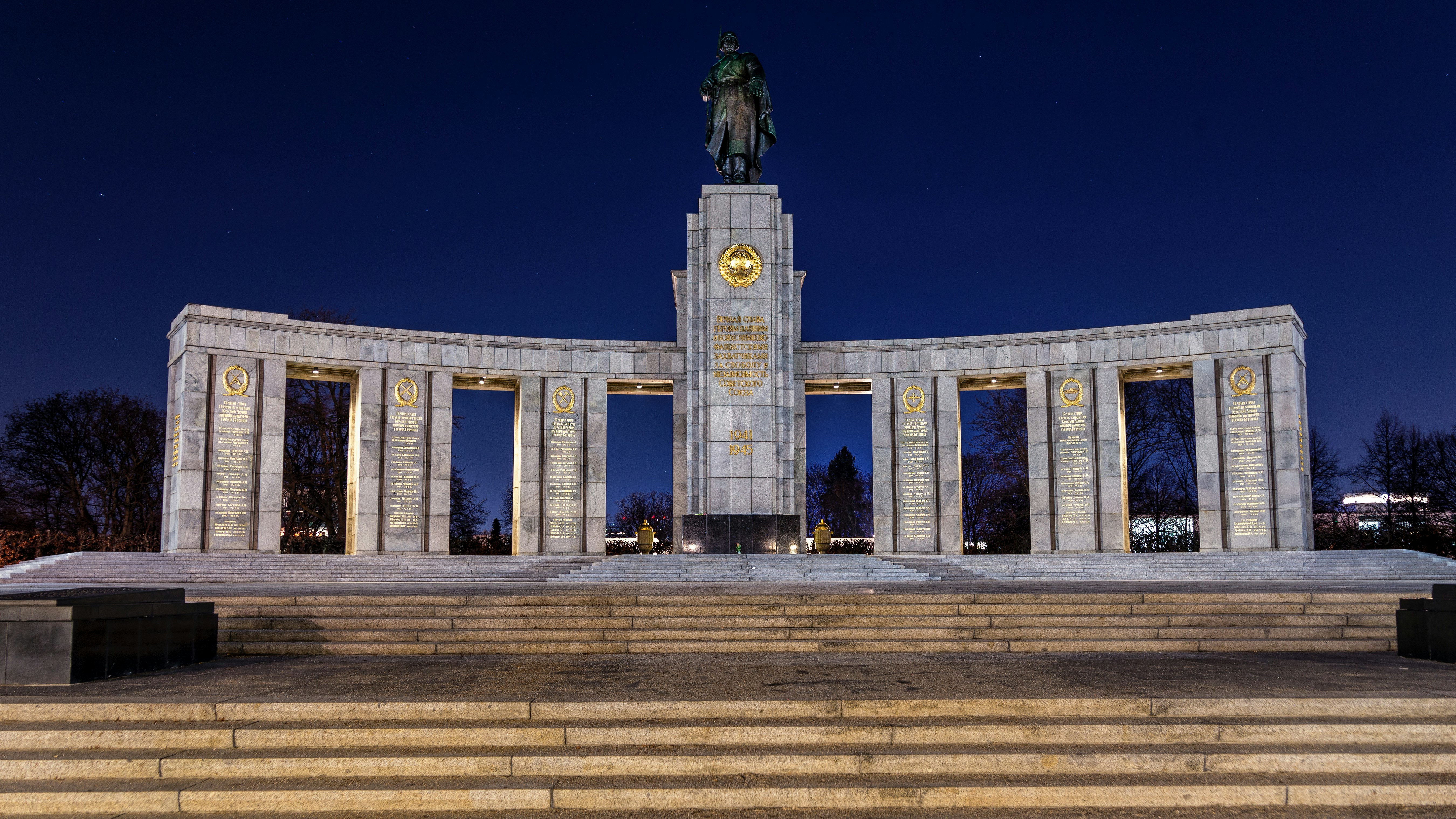 A large monument with a statue on top of it photo – Free Berlin Image ...