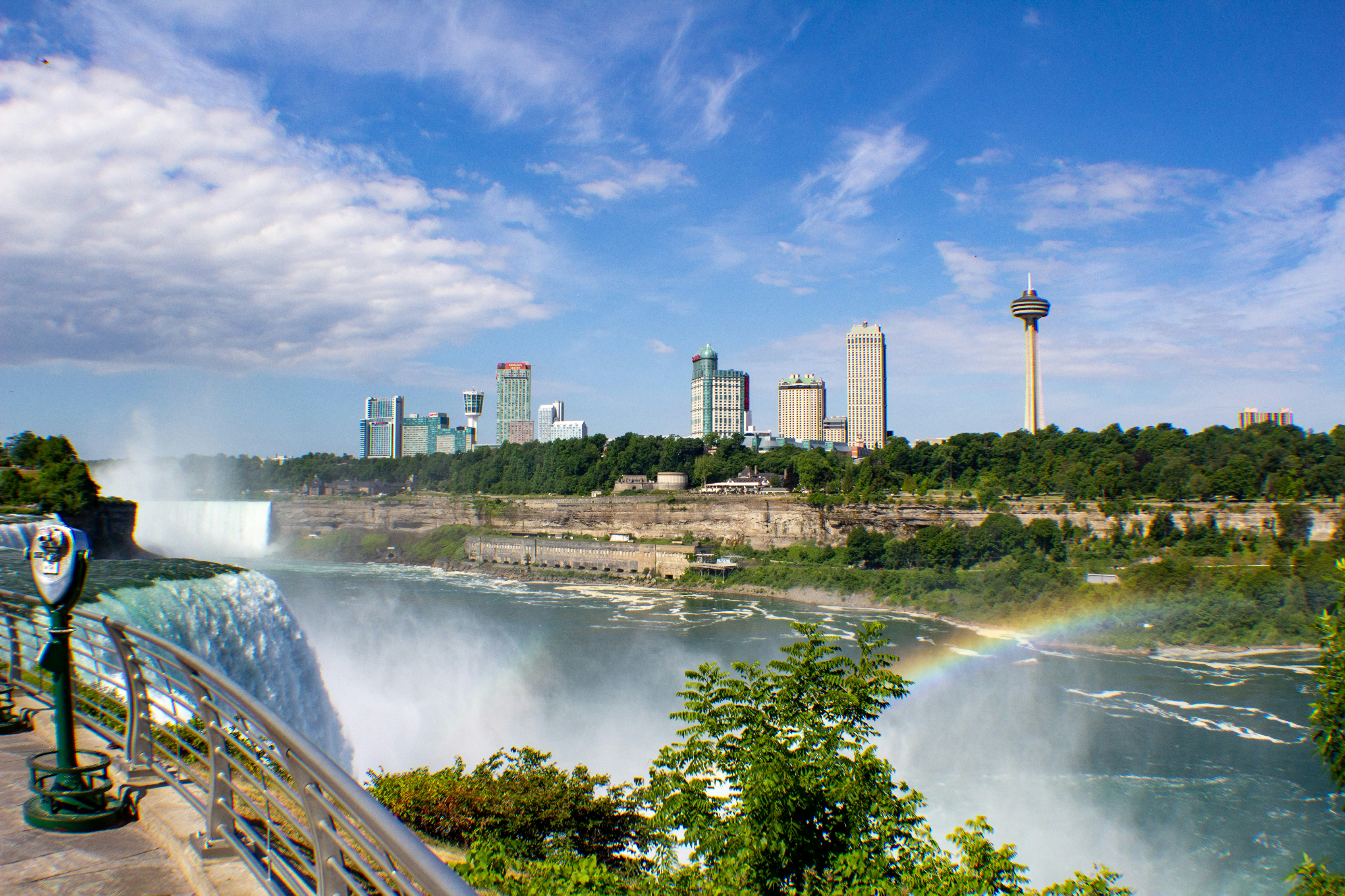 Niagara Falls. | a view of niagara falls with a rainbow in the background