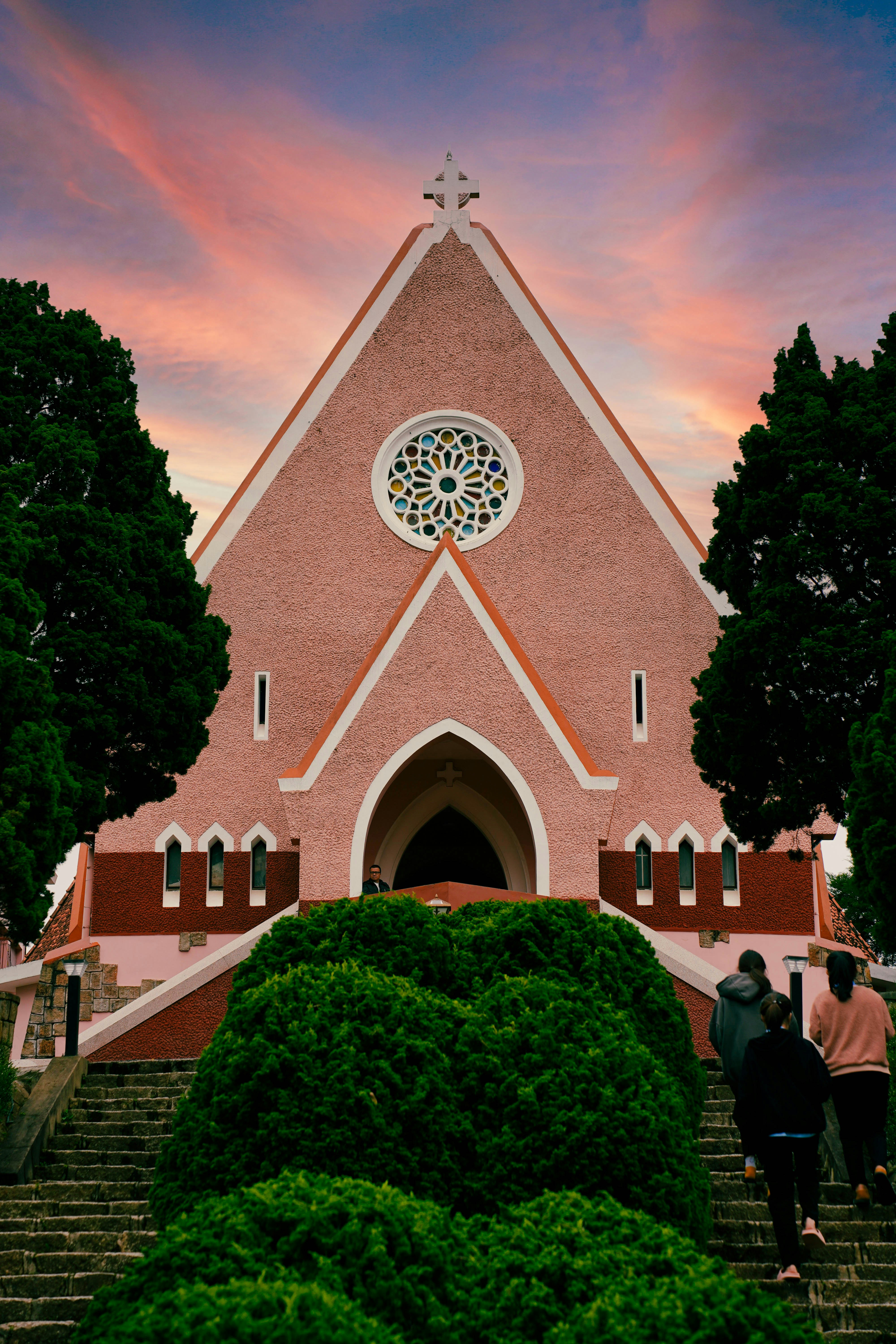 A church with a steeple and a stained glass window photo – Free Da lat ...