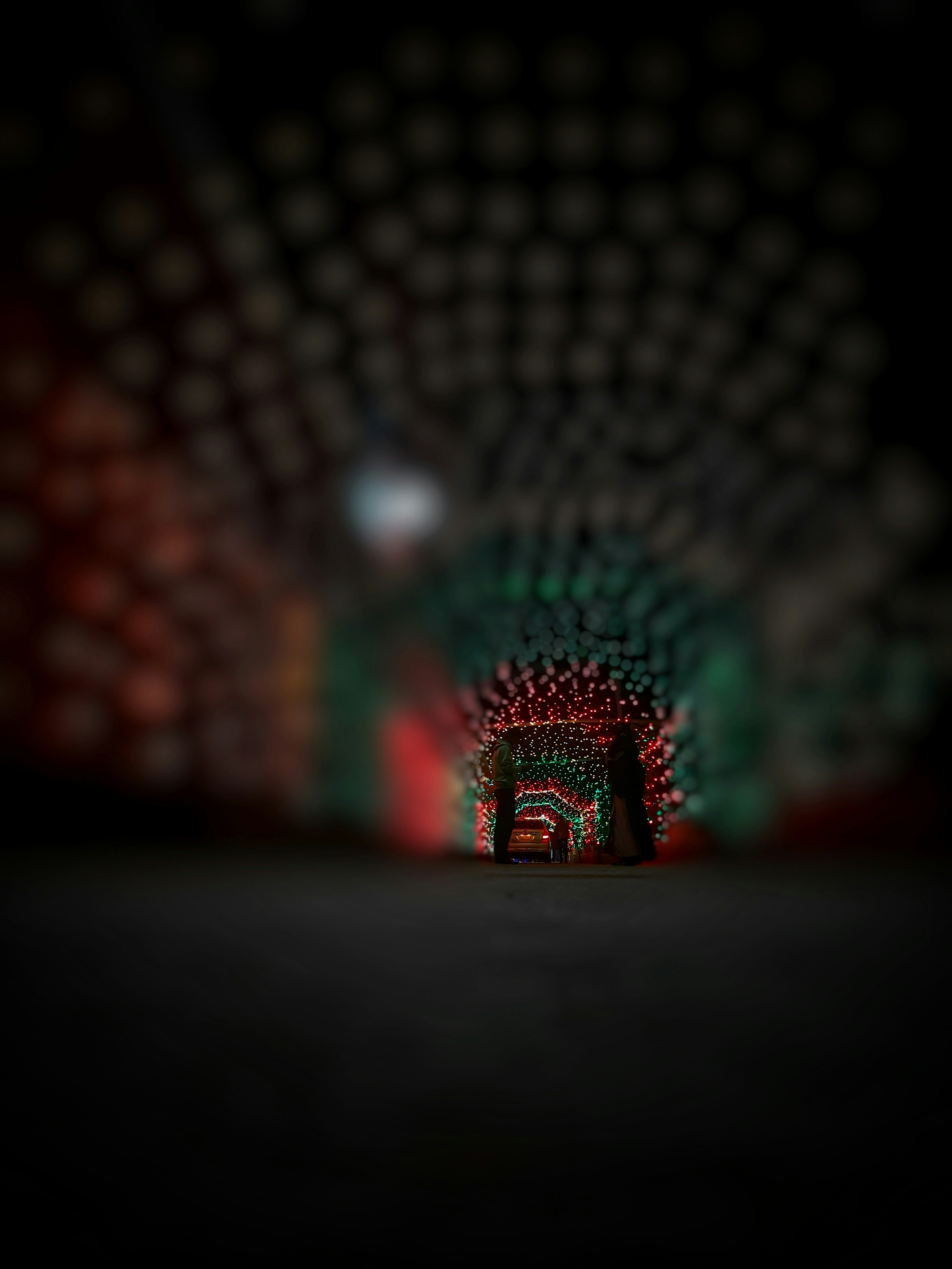 Neon Archway Corridor: A Tunnel of Lights Beyond the Dark