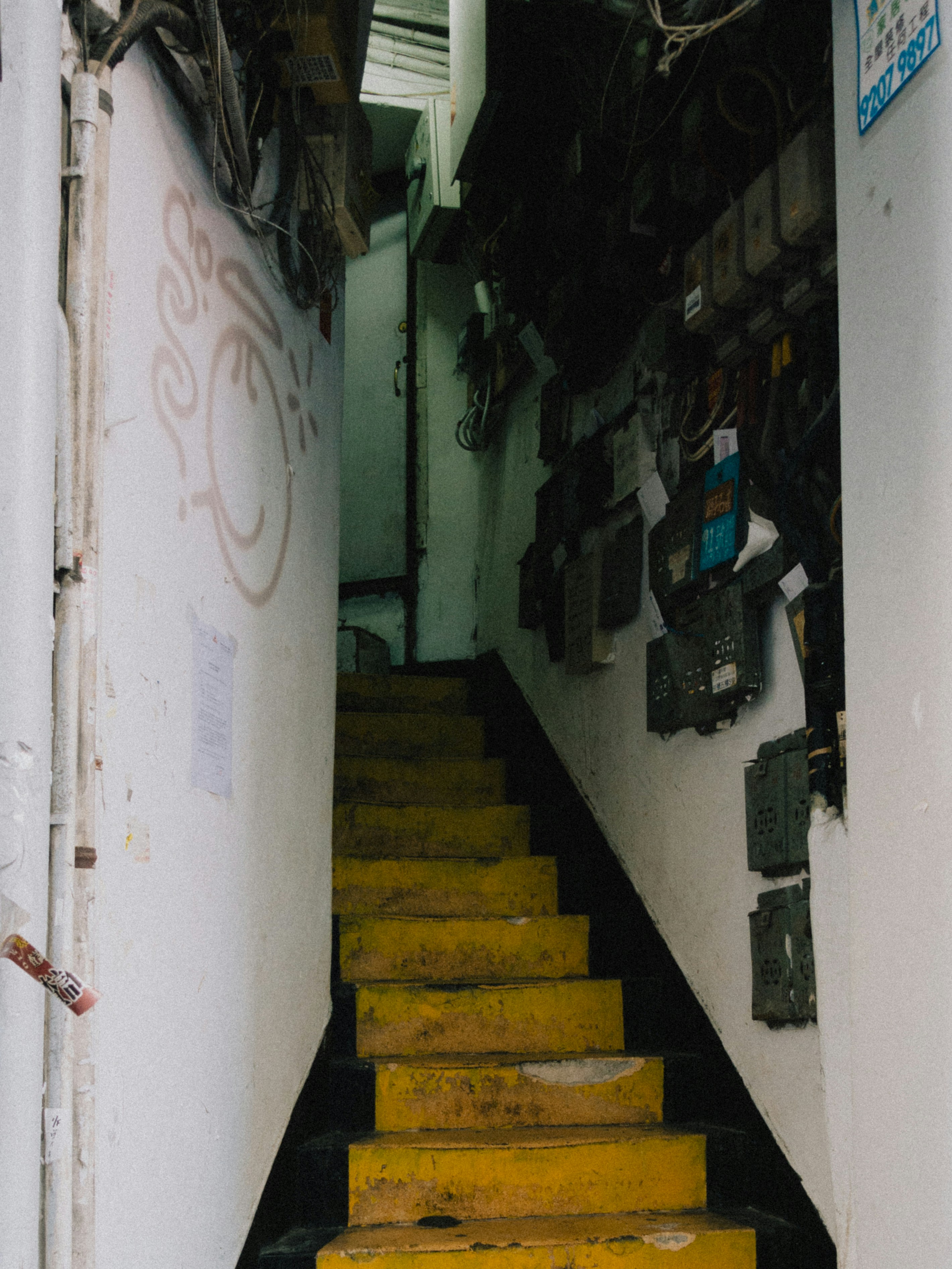 A set of yellow steps leading up to a building photo – Free City Image ...