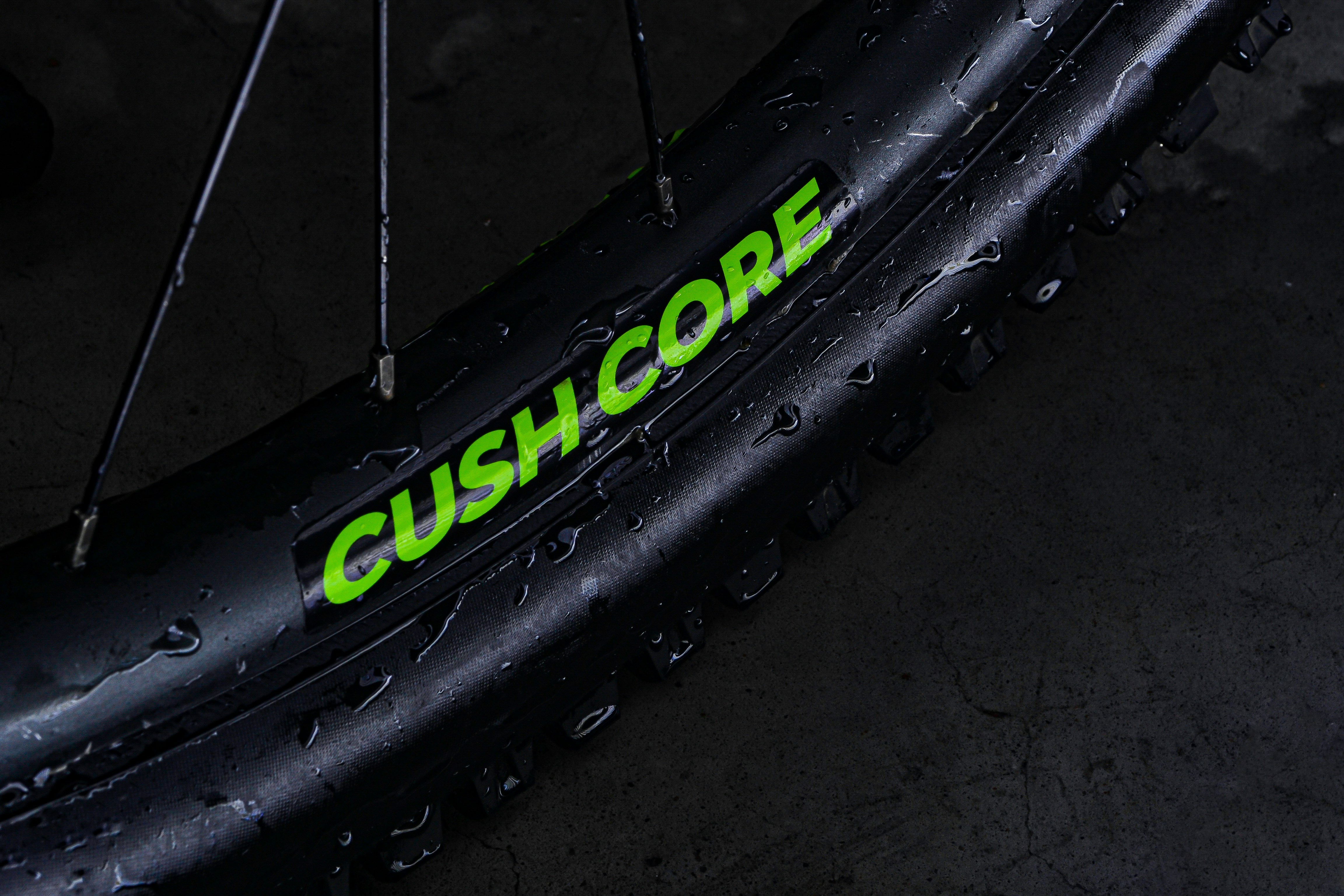 A close up of a bike tire with the word cush core on it photo – Free ...