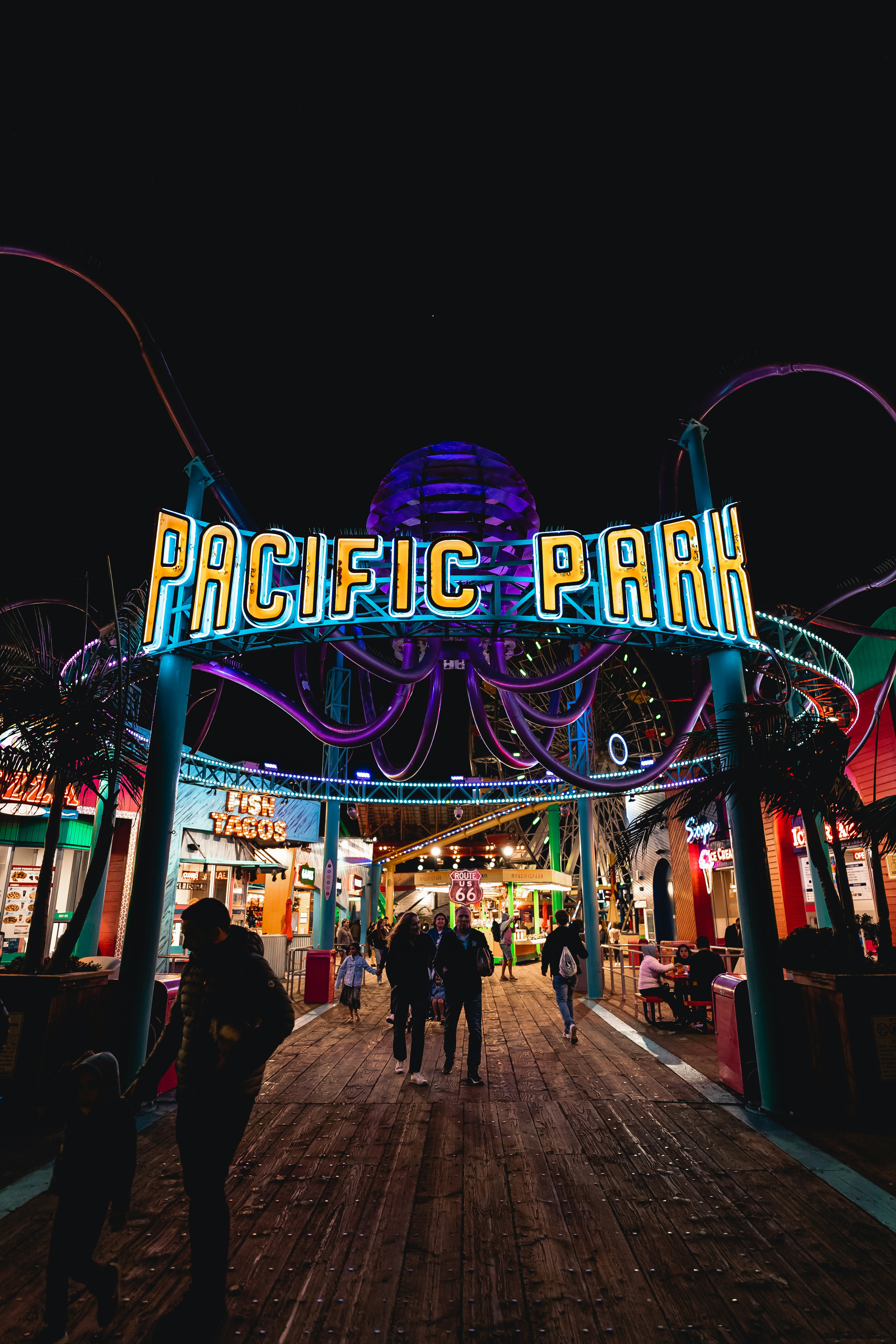 Electric Archway: Neon Pacific Park Entrance After Dark