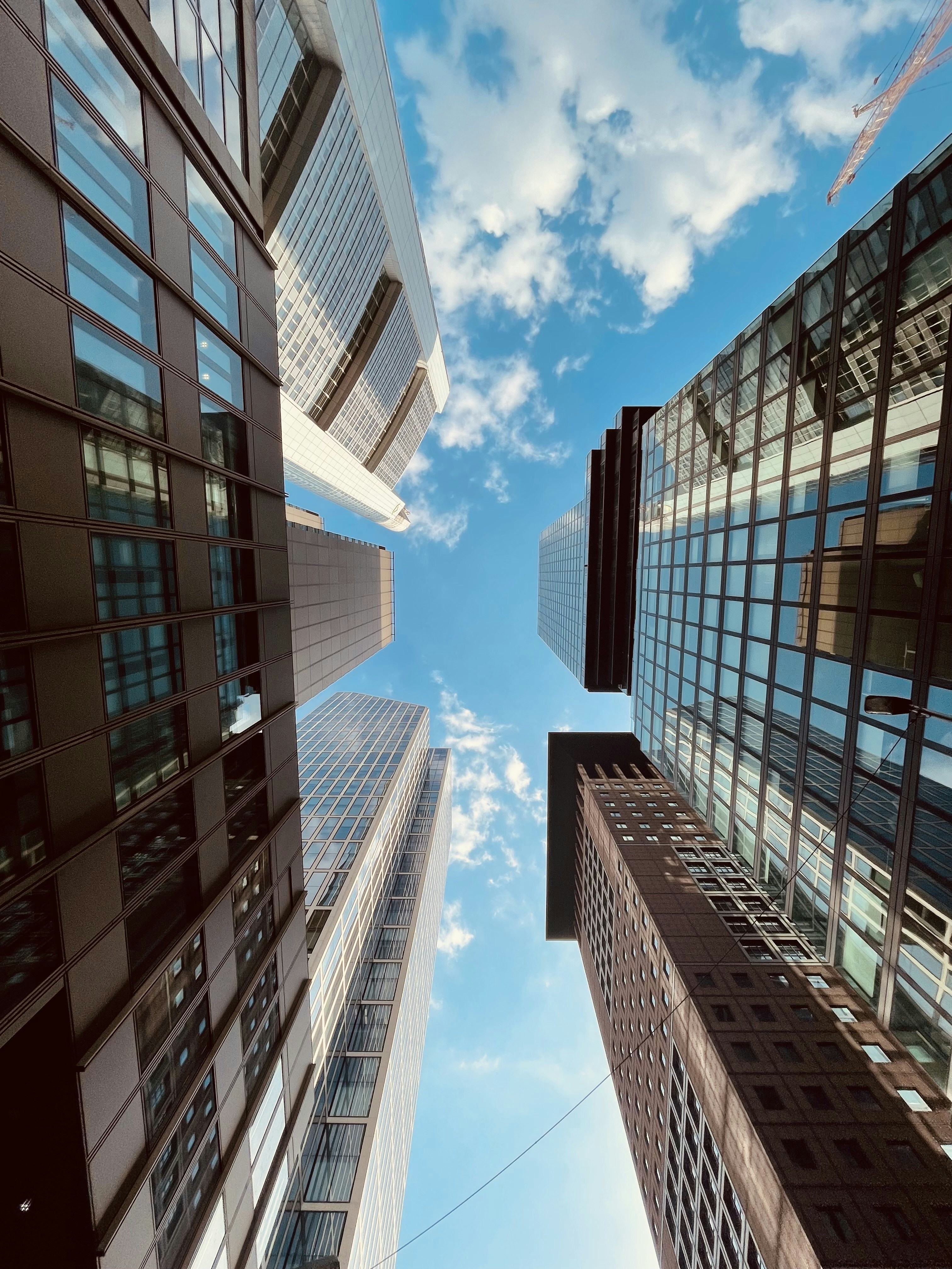 Looking up at tall buildings in a city photo – Free Deutschland Image ...