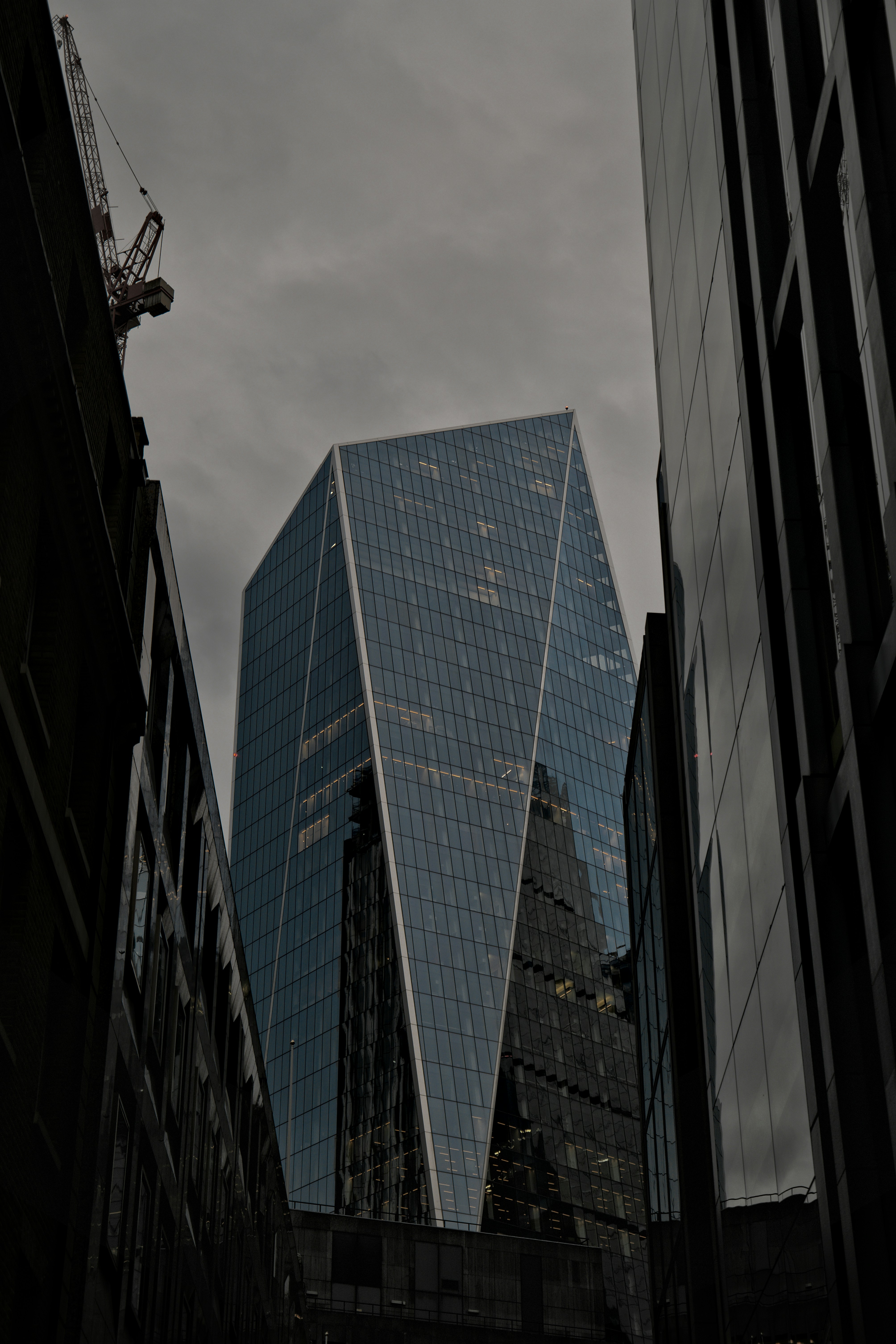 A very tall building sitting between two other buildings photo – Free ...