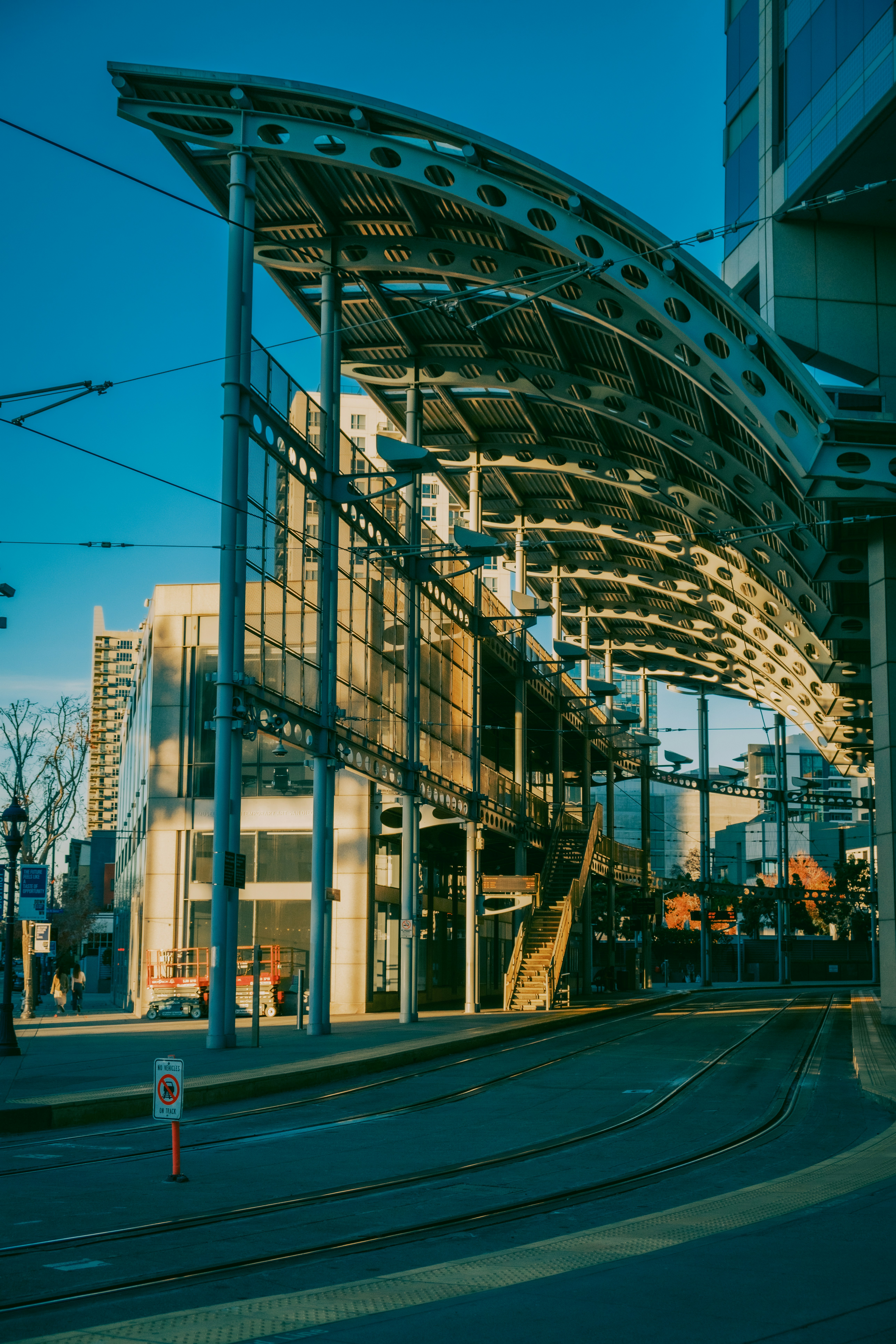 a train station with a train on the tracks