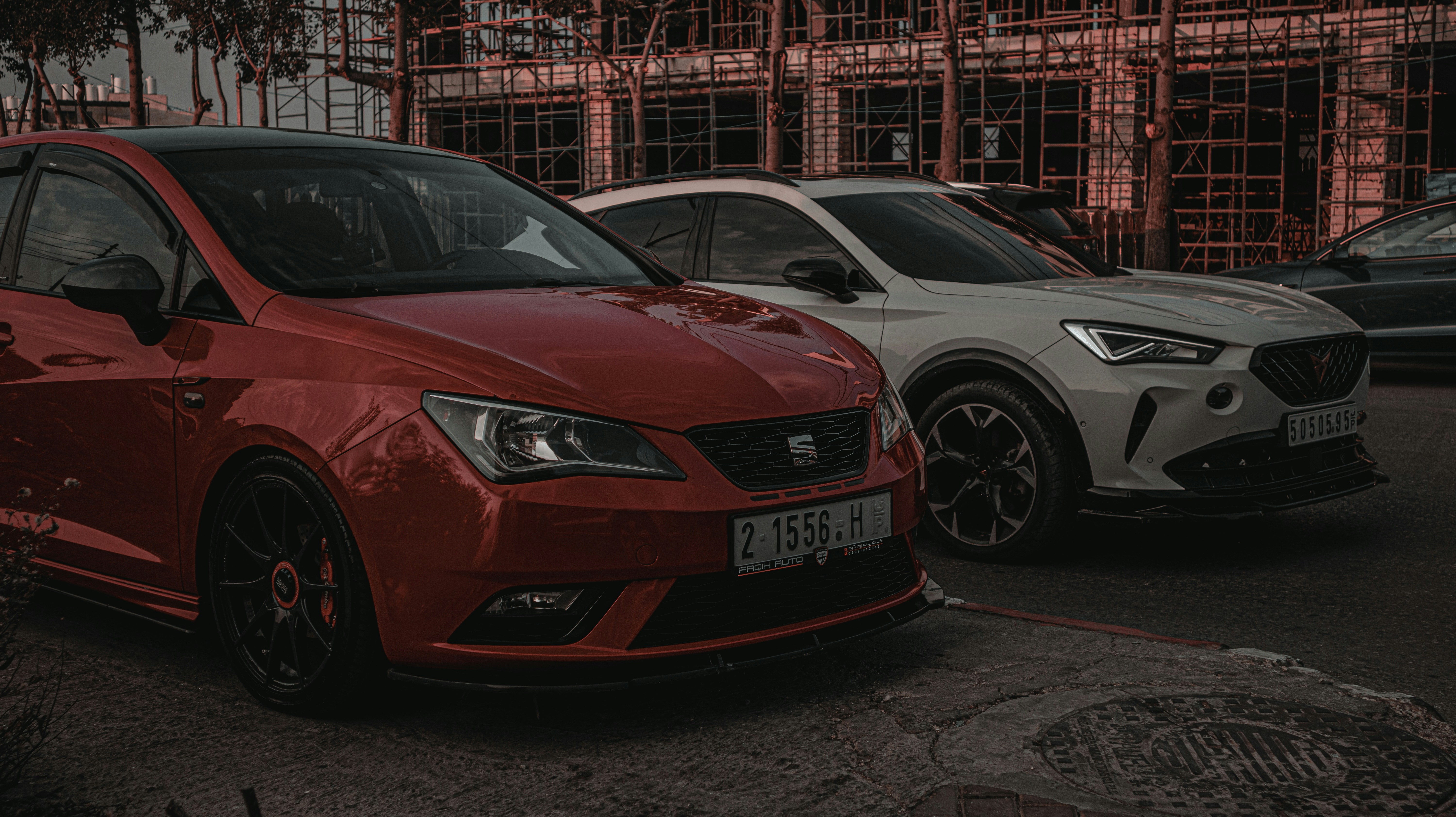 A couple of cars parked next to each other photo – Free Ramallah Image ...