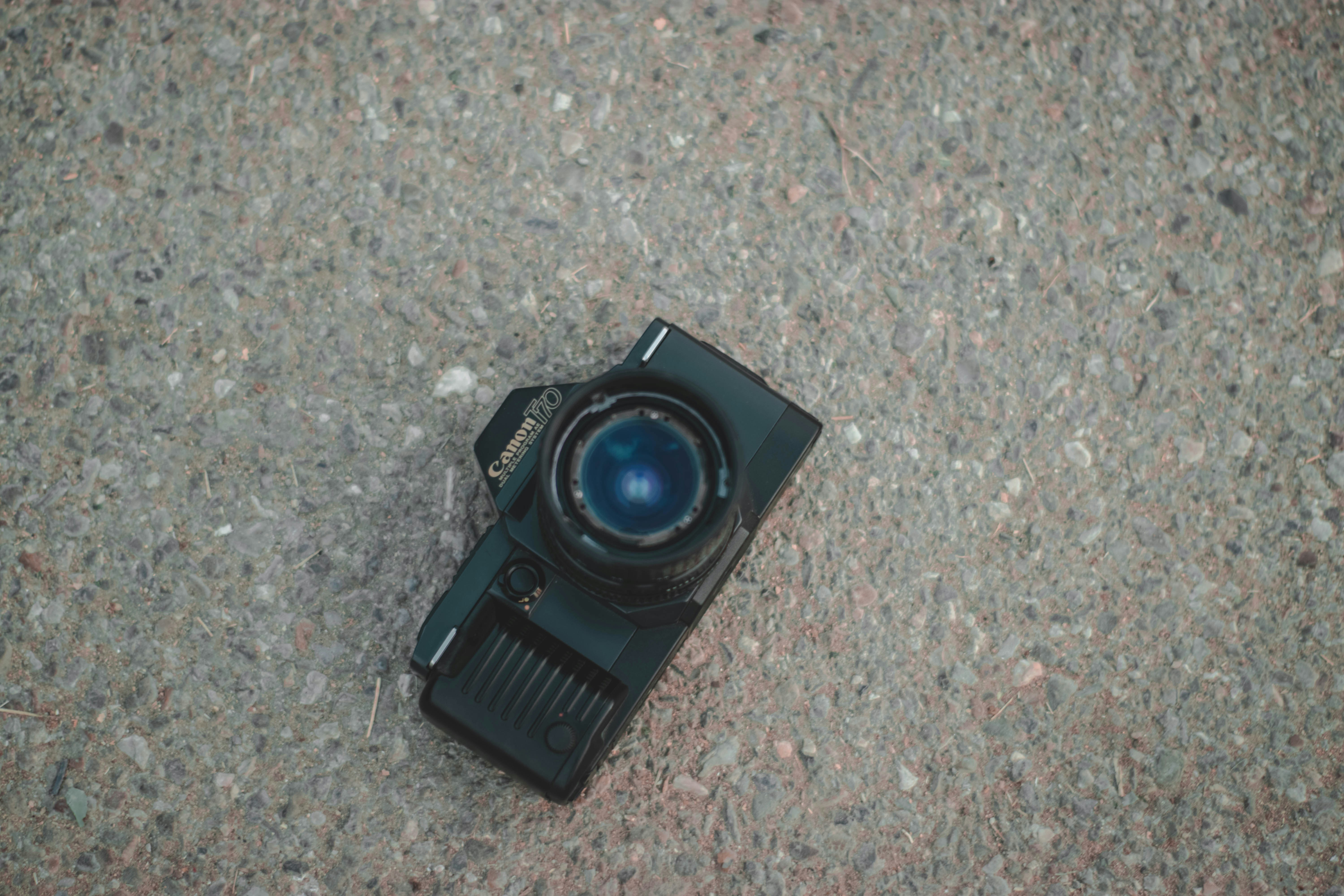 An overhead view of a camera on the ground photo – Free Camera Image on ...
