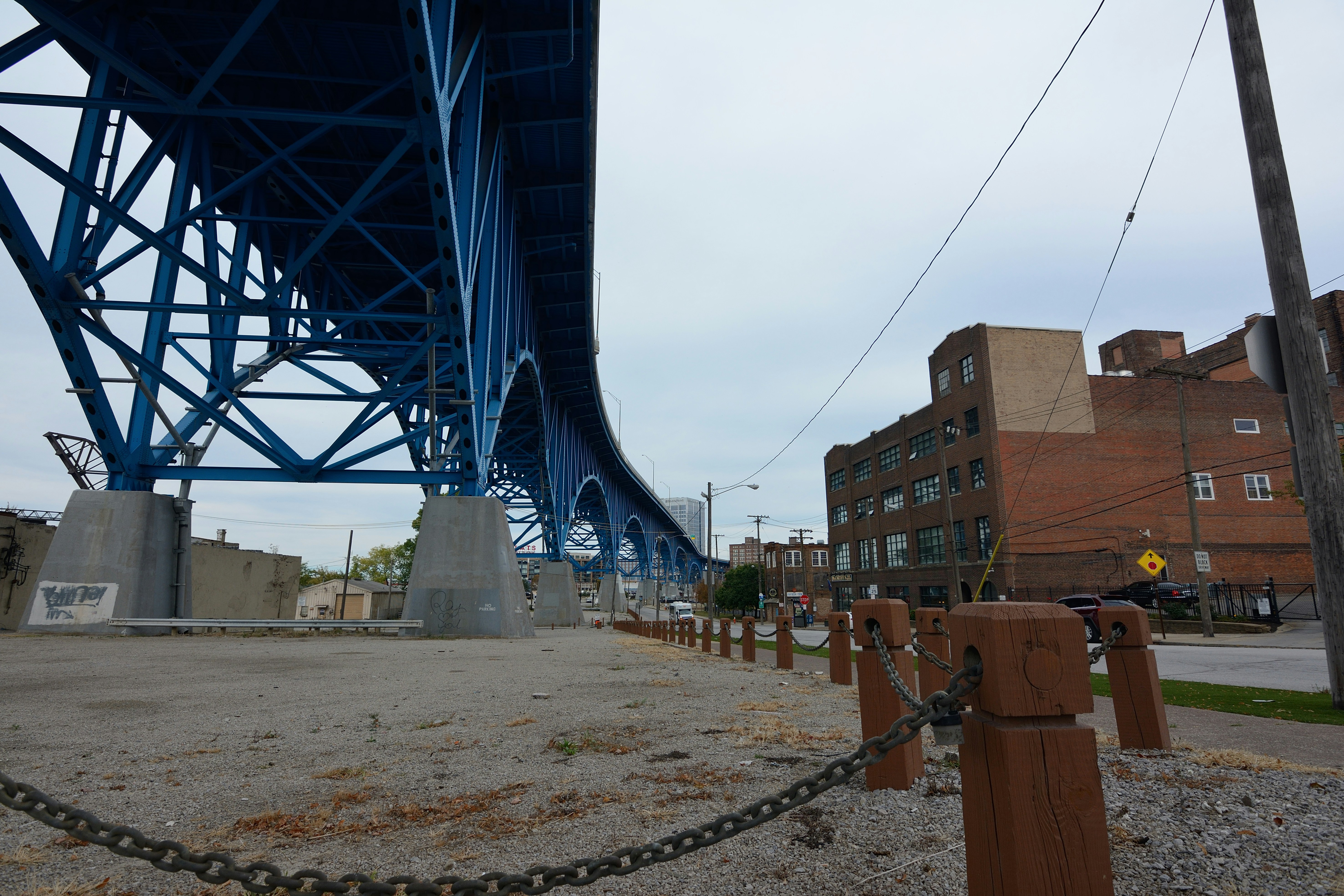 A large blue bridge spanning over a city street photo – Free Cleveland ...