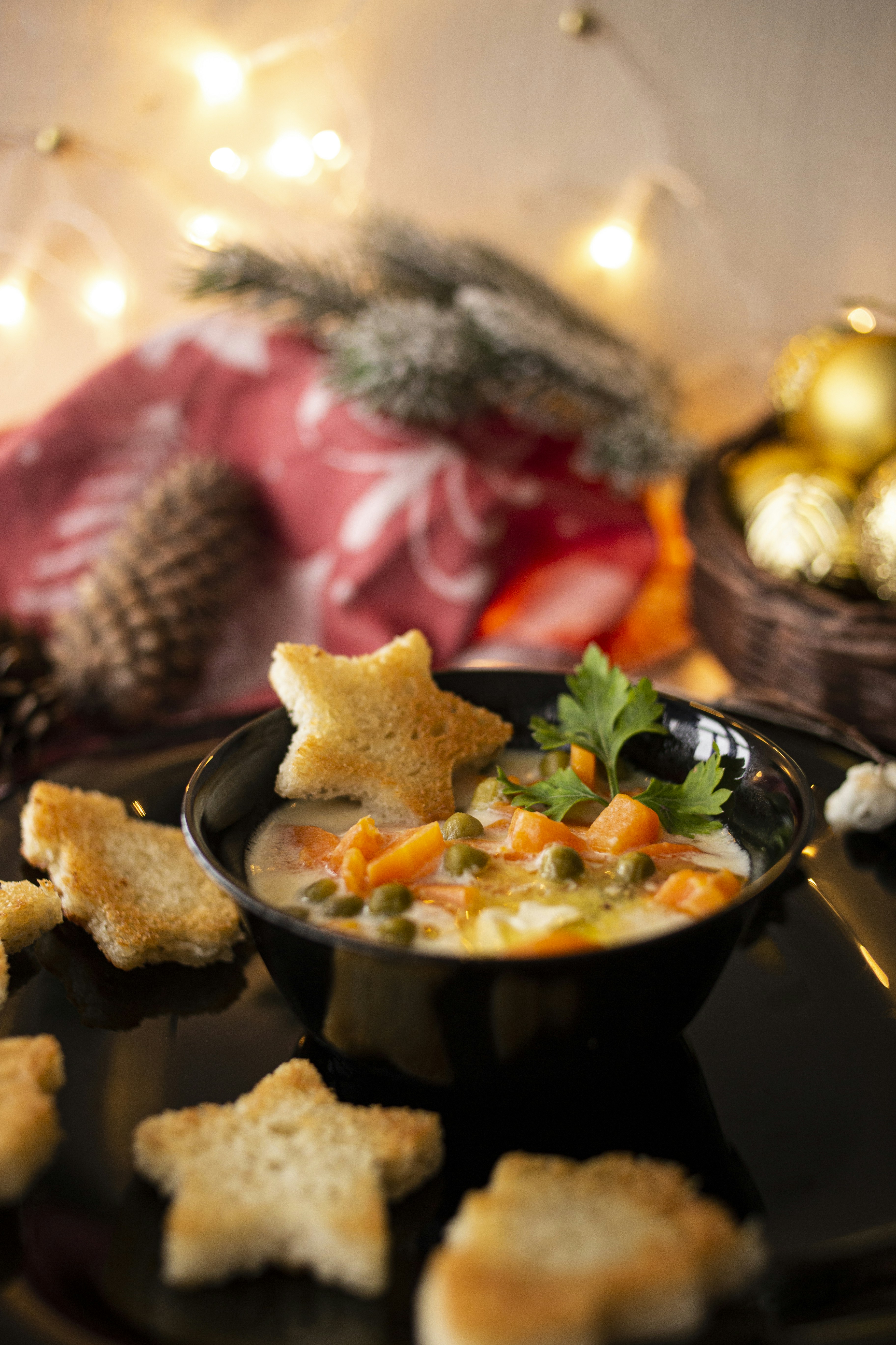 a bowl of soup and crackers on a table
