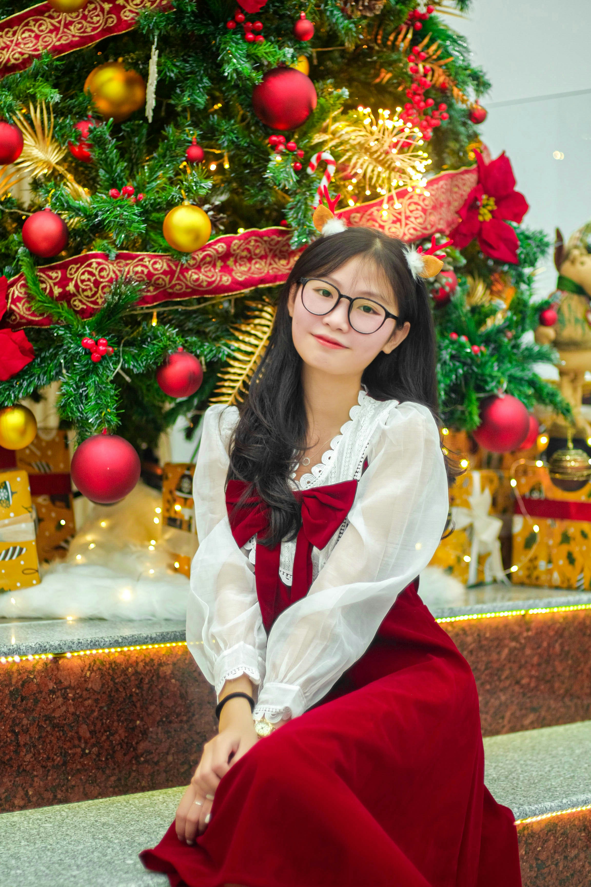 Winter Bloom: Portrait Beneath a Christmas Velvet