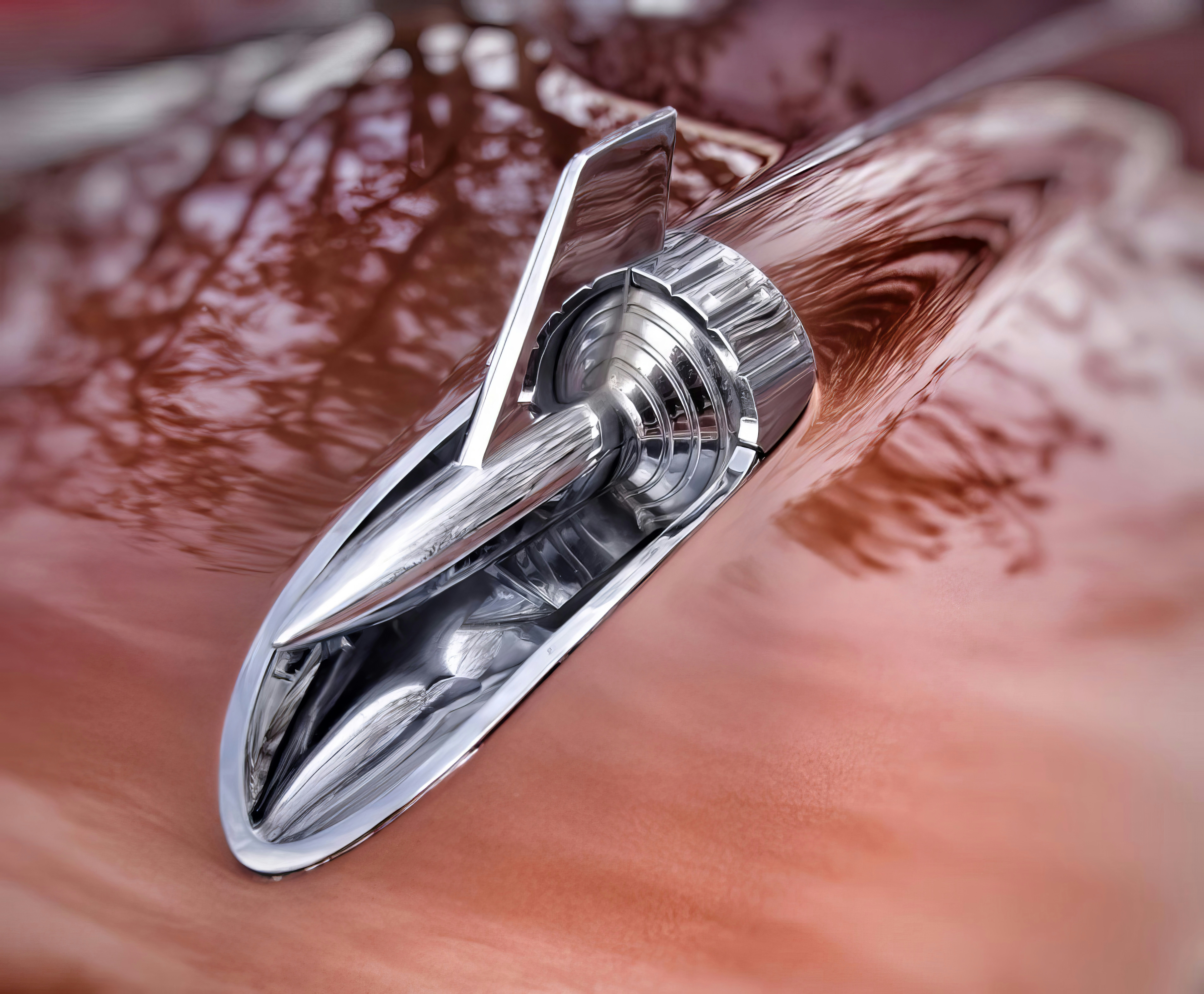 A close up of a shiny metal object photo – Free Headlight Image on Unsplash