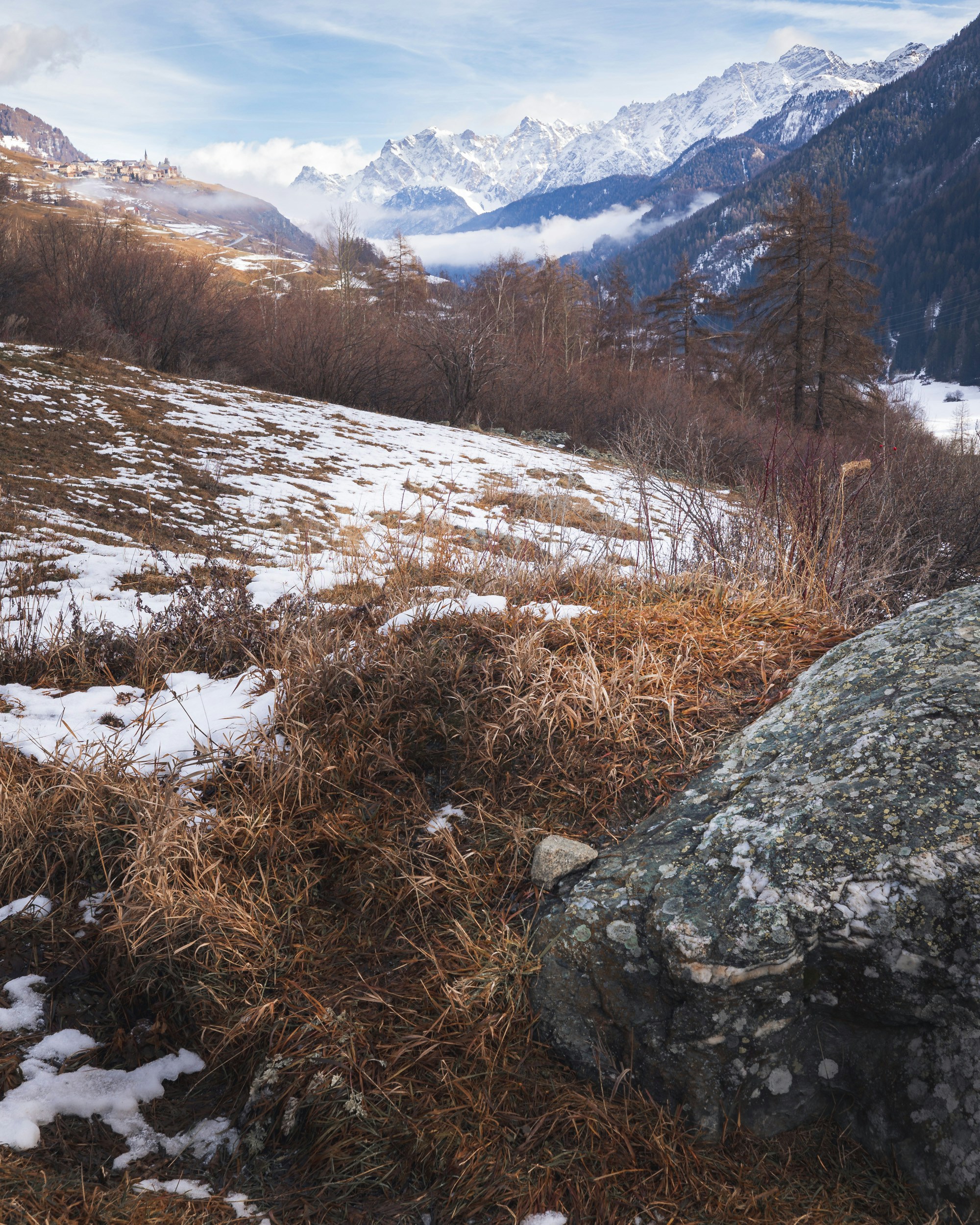 Whispers of Winter in the Alpine Valley