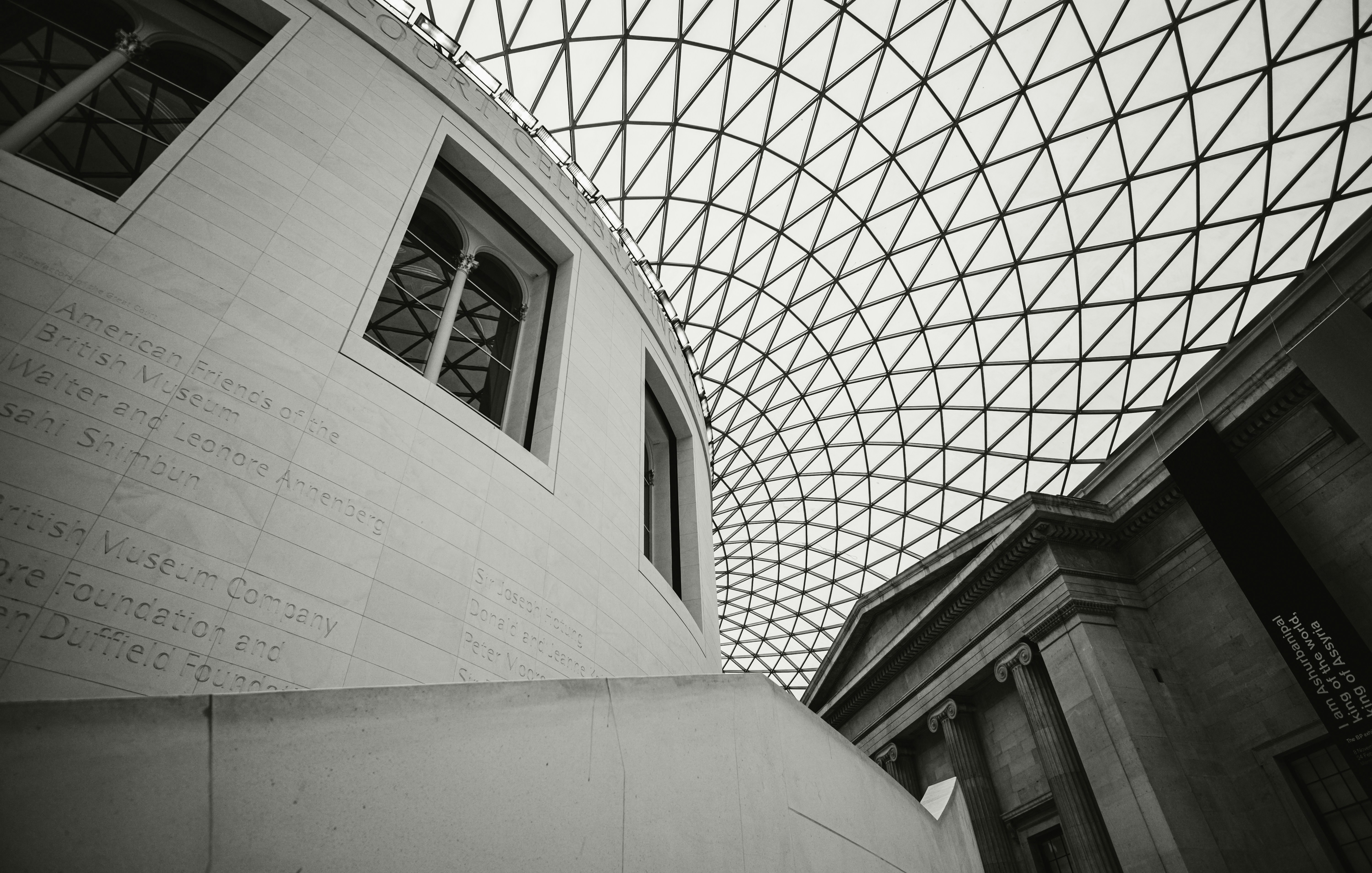 Crystallized Vault: Lattice Glass Roof Over Curved Gallery Walls